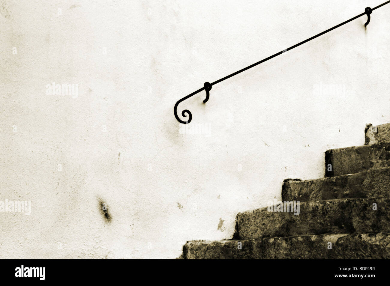Stone steps and a railing Stock Photo - Alamy