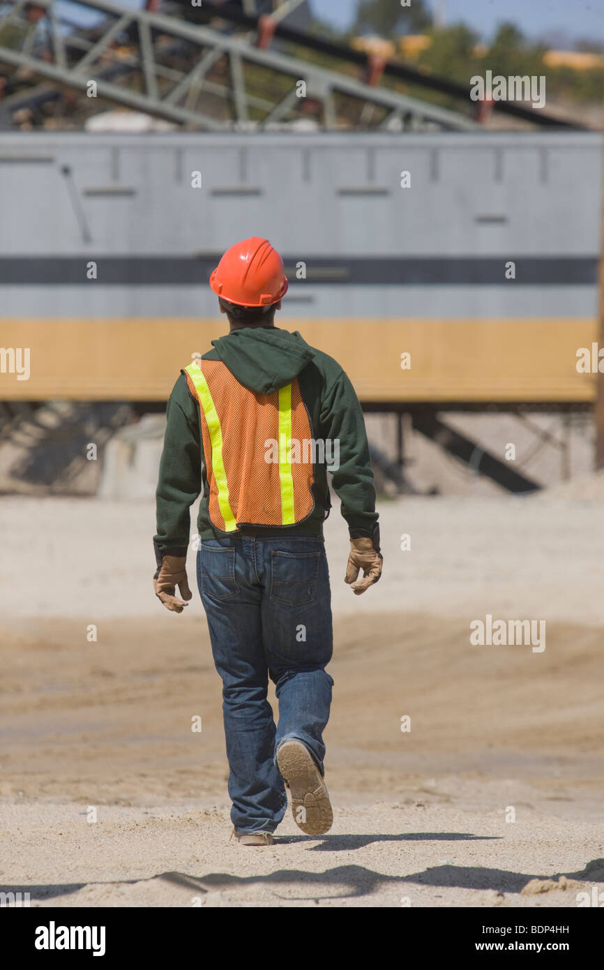 Engineer walking at a plant Stock Photo - Alamy