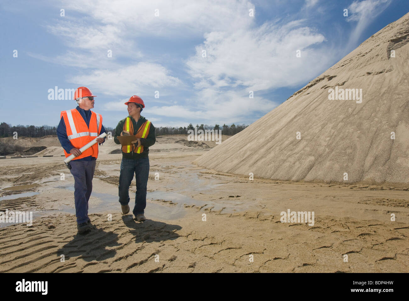 Two engineers discussing Stock Photo - Alamy