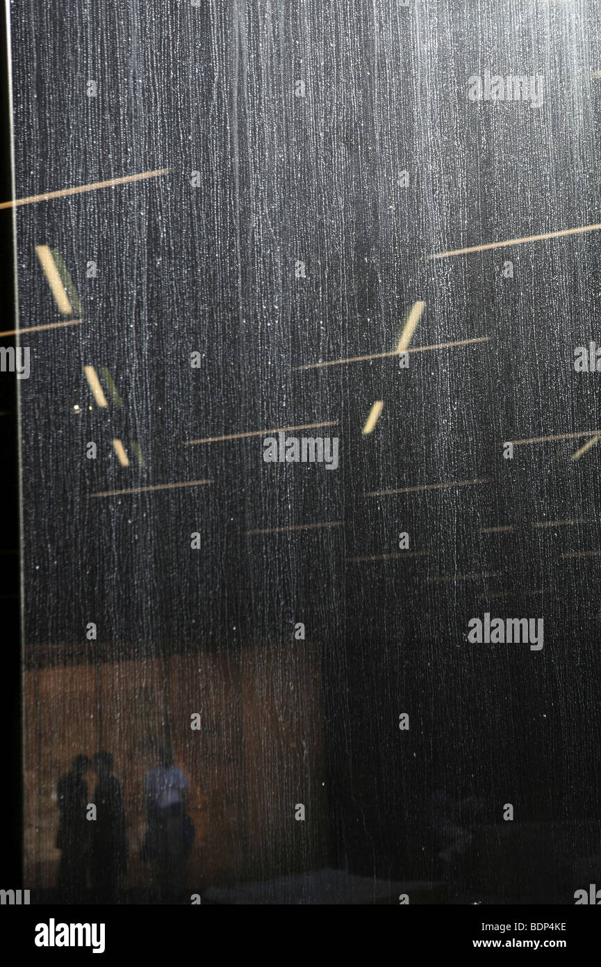 Heavy rain with figures in the distance sheltering Stock Photo - Alamy