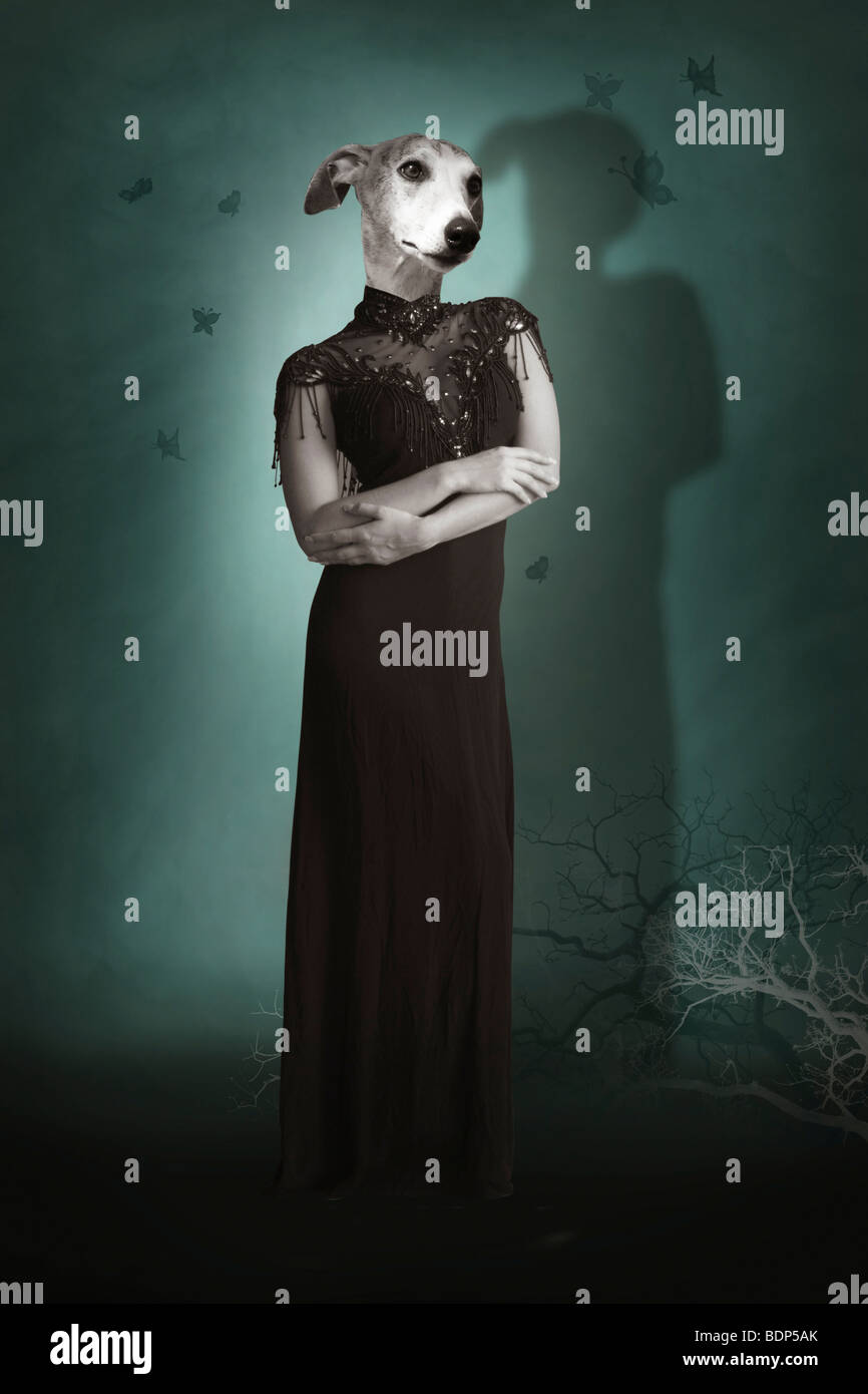 lady in a black dress with a dogs head Stock Photo - Alamy