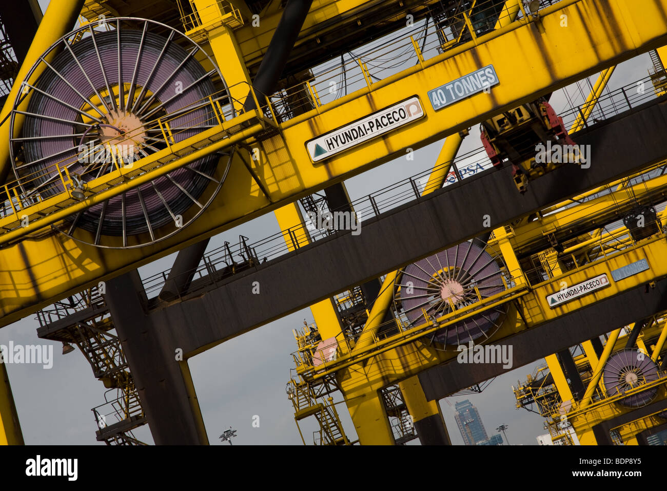 Container port crane spool cable cabling cranes Stock Photo - Alamy