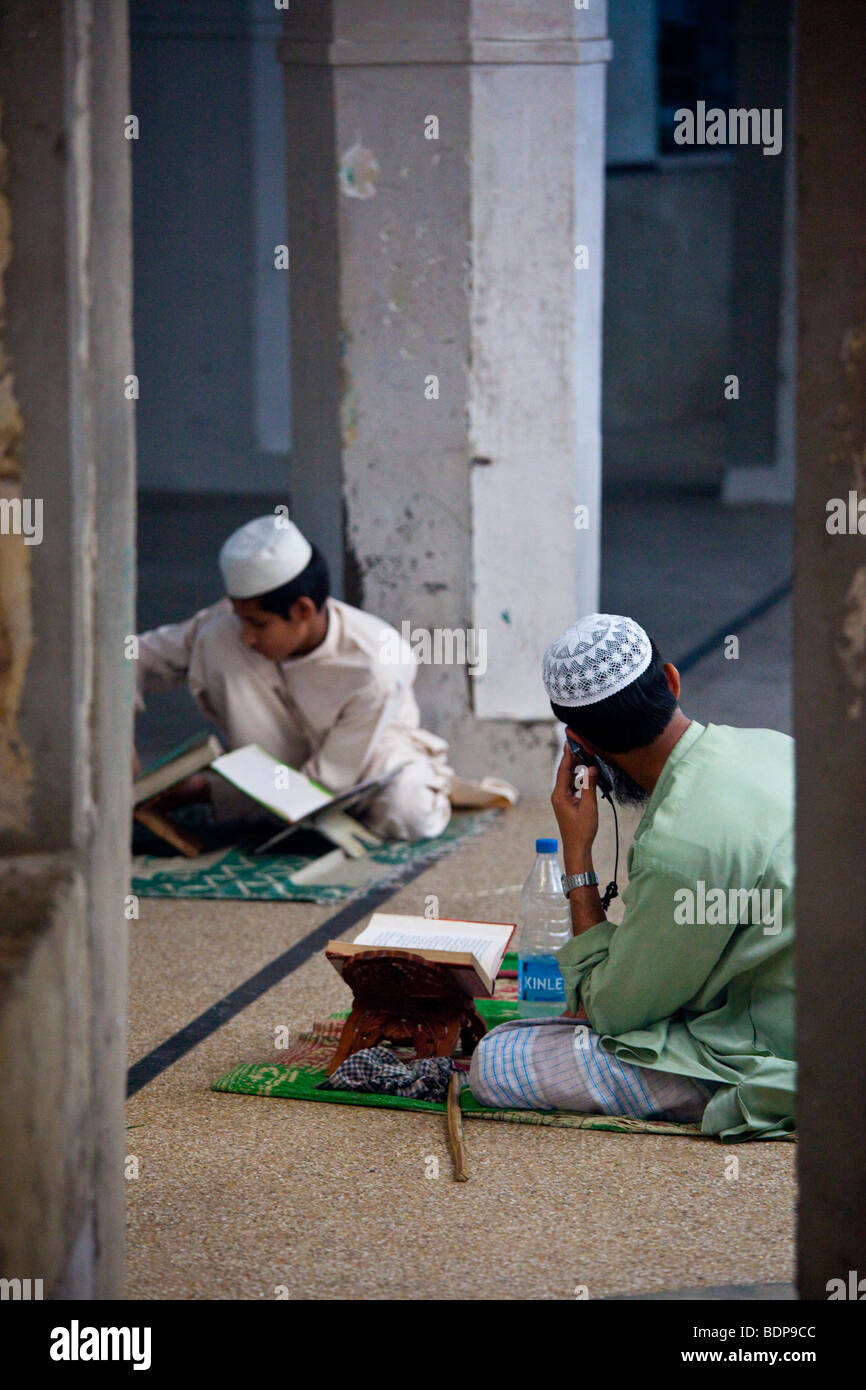 Young men in a madrasa in Calcutta India Stock Photo - Alamy