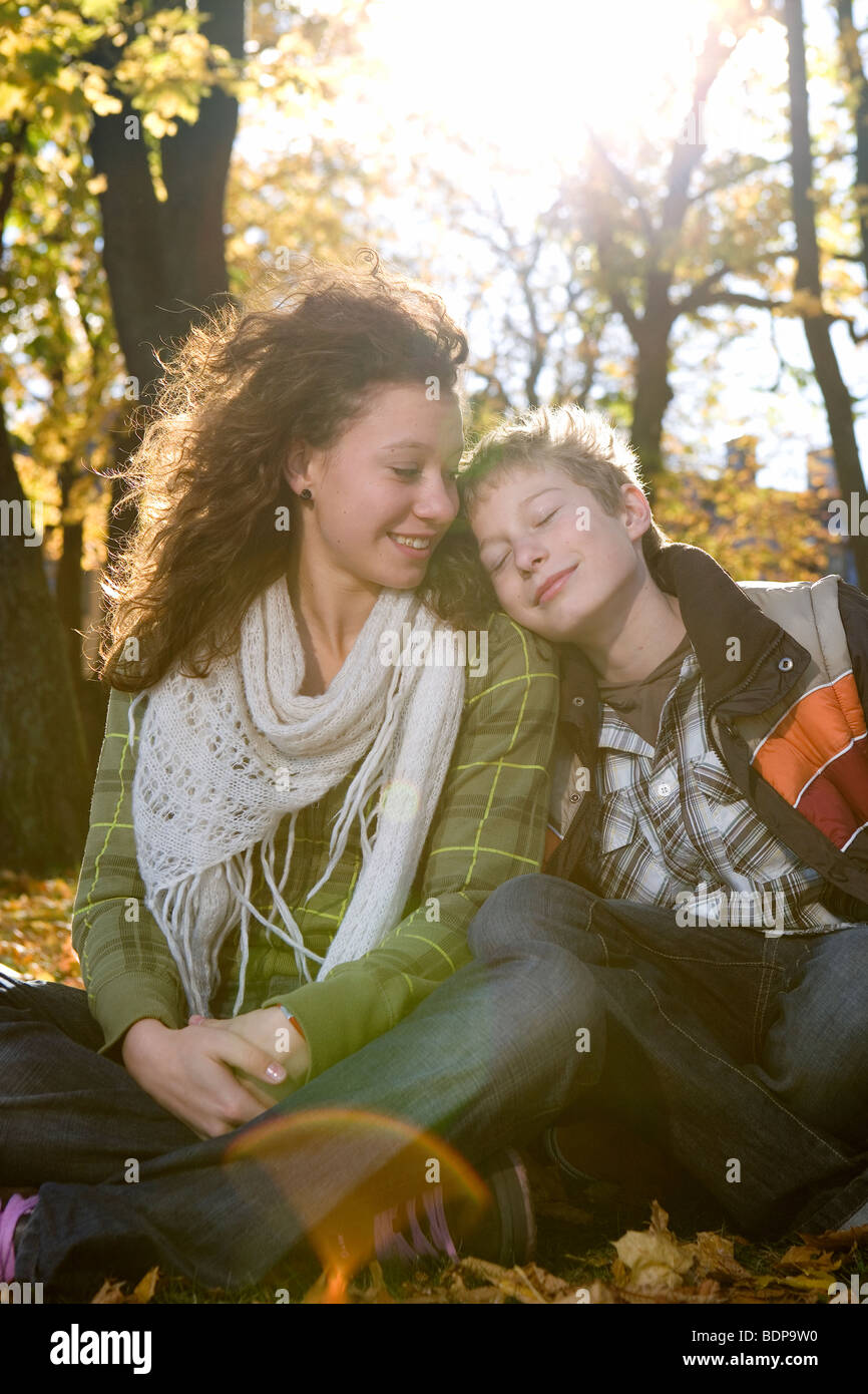 Sister and brother in the autumnal sun Sweden Stock Photo - Alamy