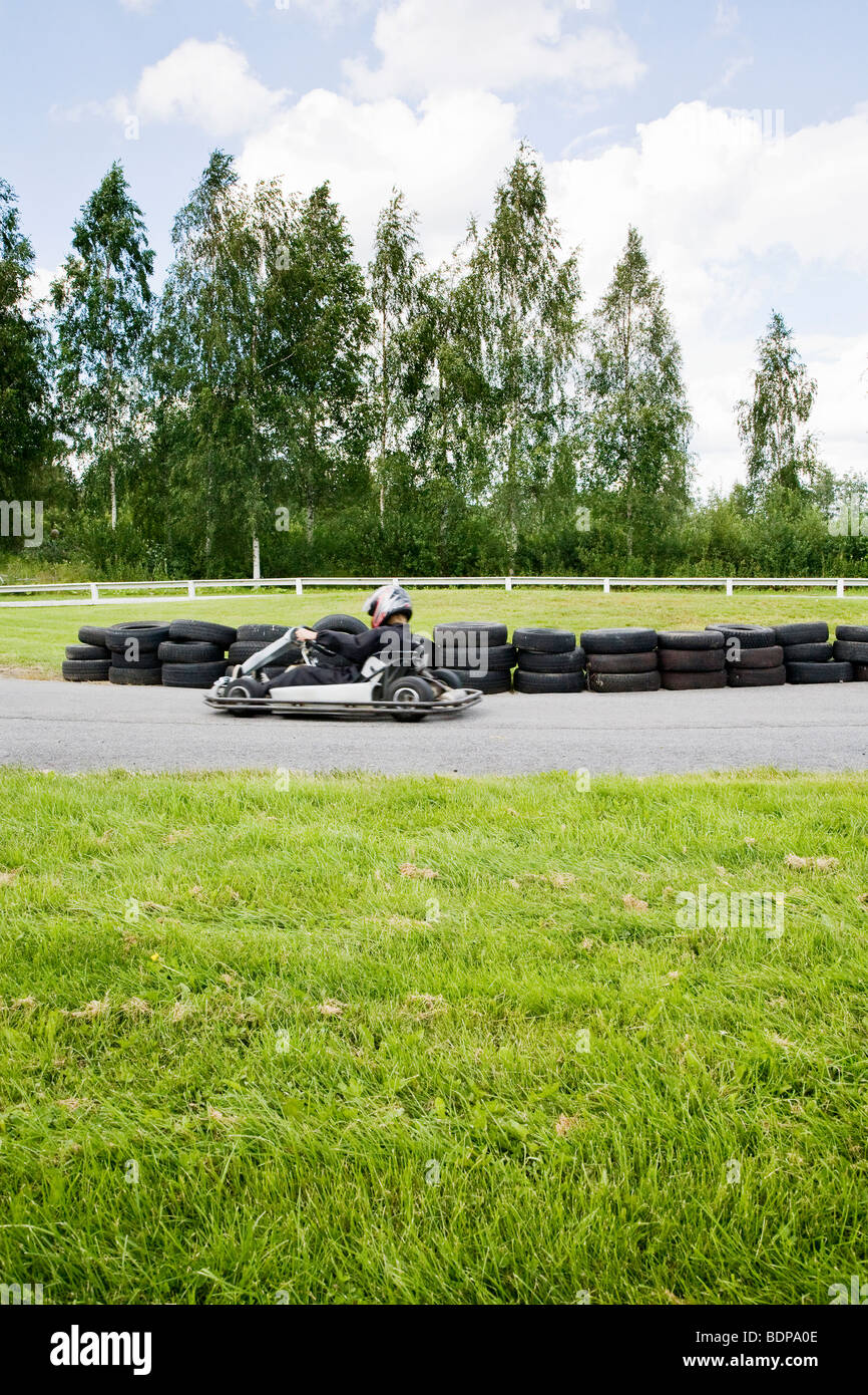 Boy driving go cart hi-res stock photography and images - Alamy