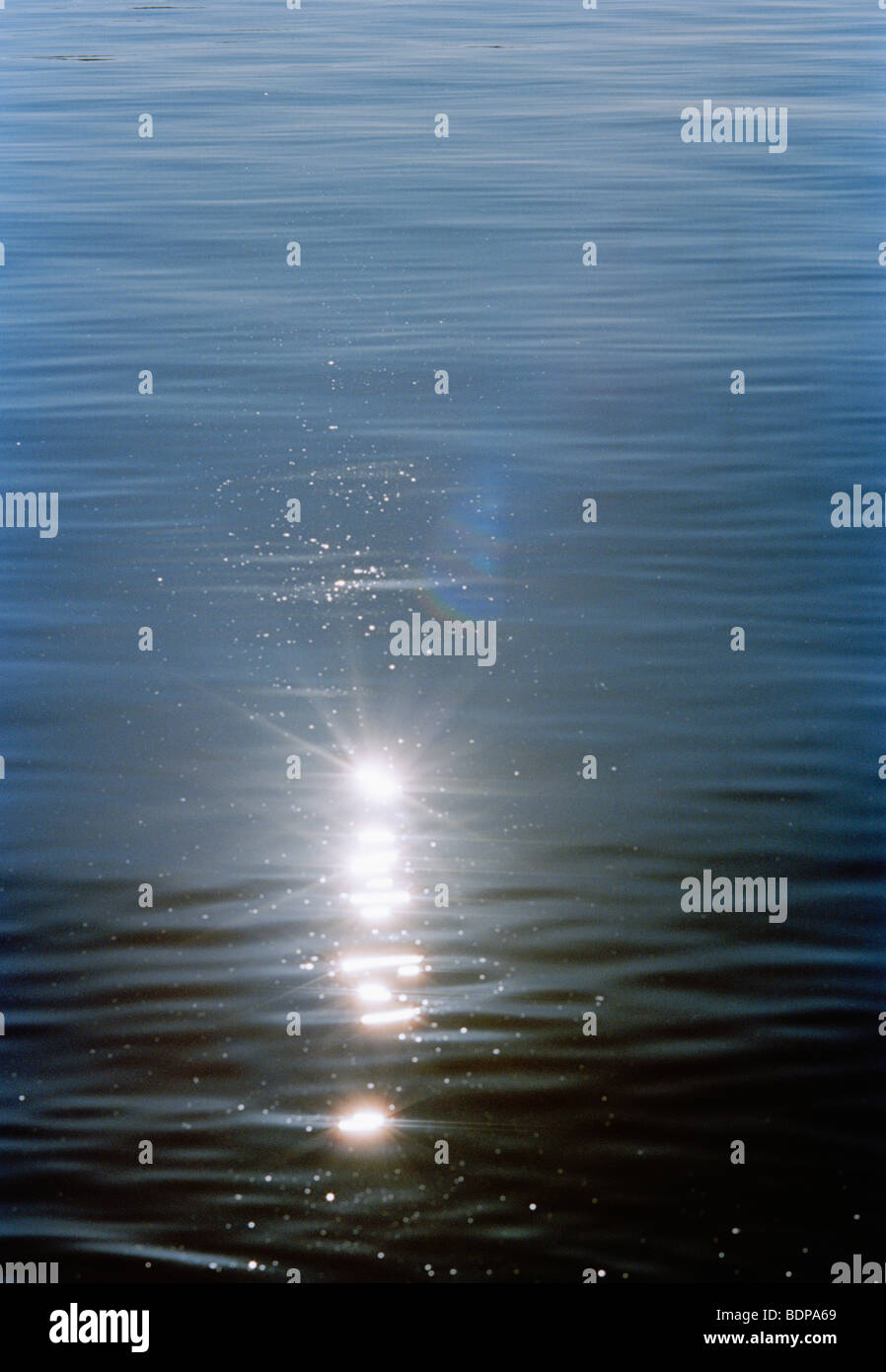 Sun reflected on the surface of the water, Sweden Stock Photo - Alamy