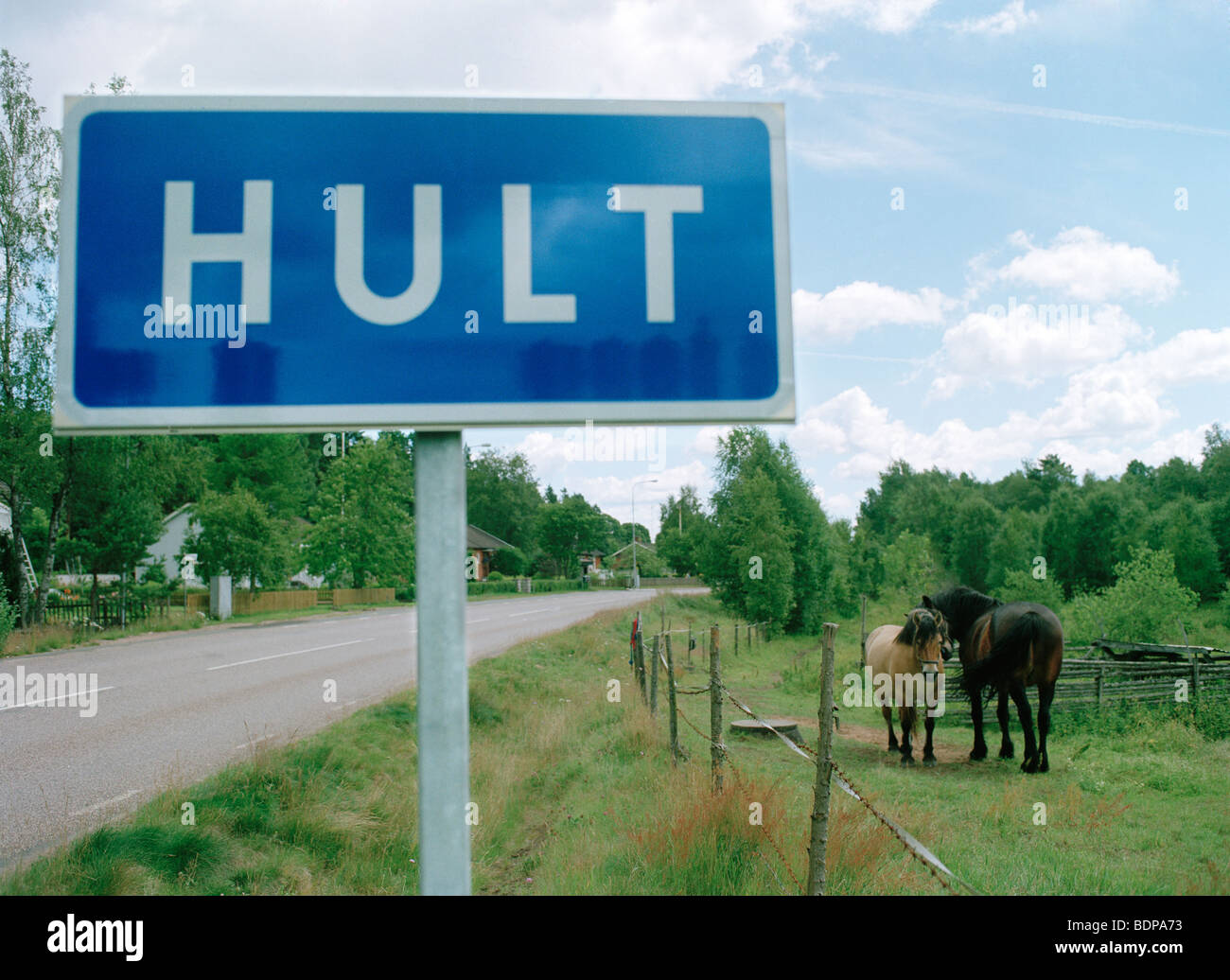 A signpost by a horse paddock Sweden Stock Photo - Alamy
