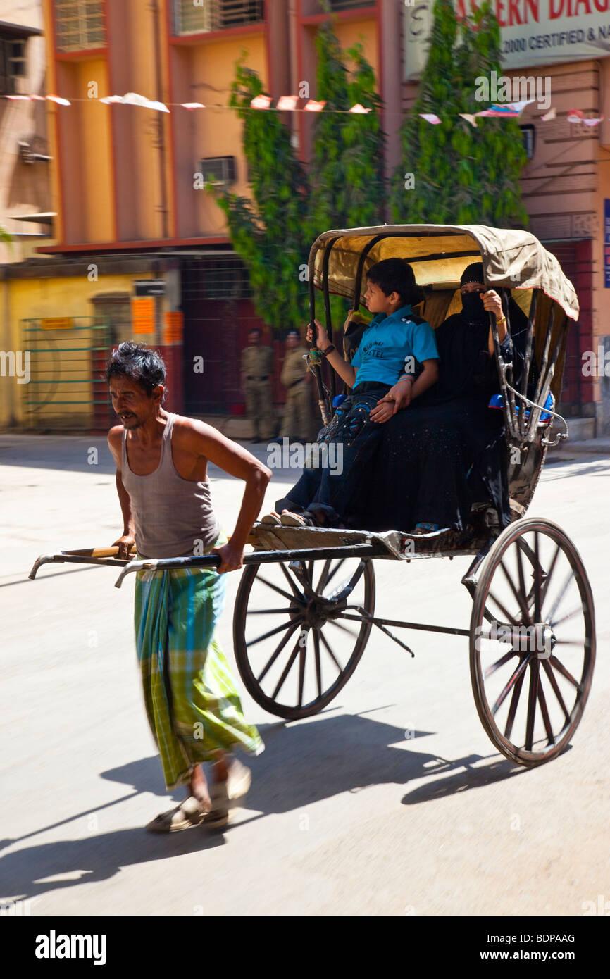 Indian pulling rickshaw hi-res stock photography and images - Alamy