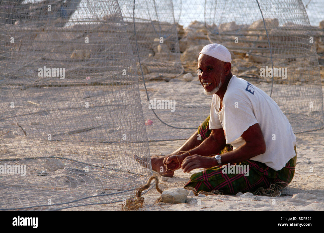 Dubai UAE Man Making Fishing Traps Stock Photo - Alamy