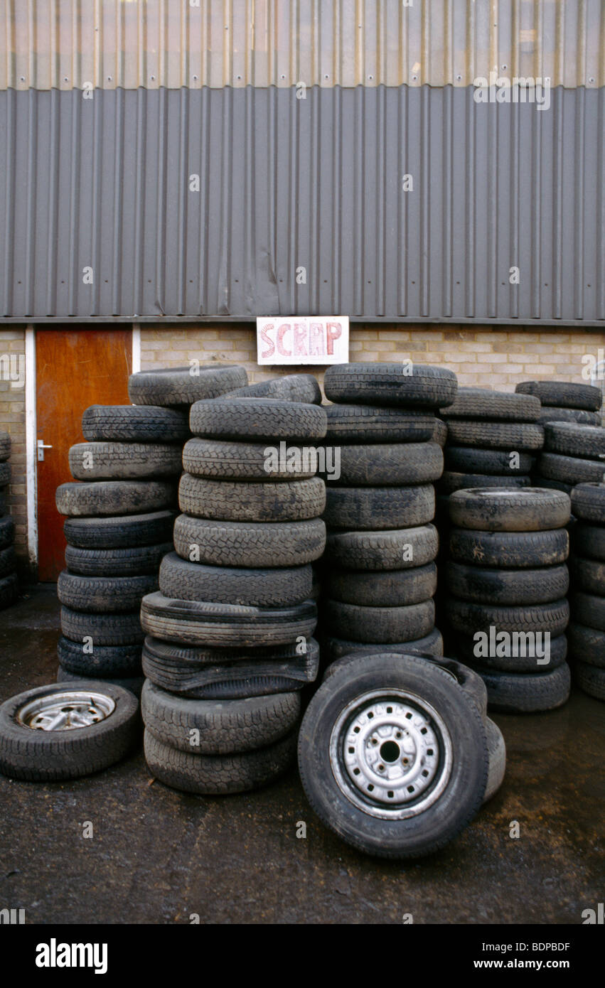 Pile Of Used Tyres In A Scrapyard Stock Photo - Alamy
