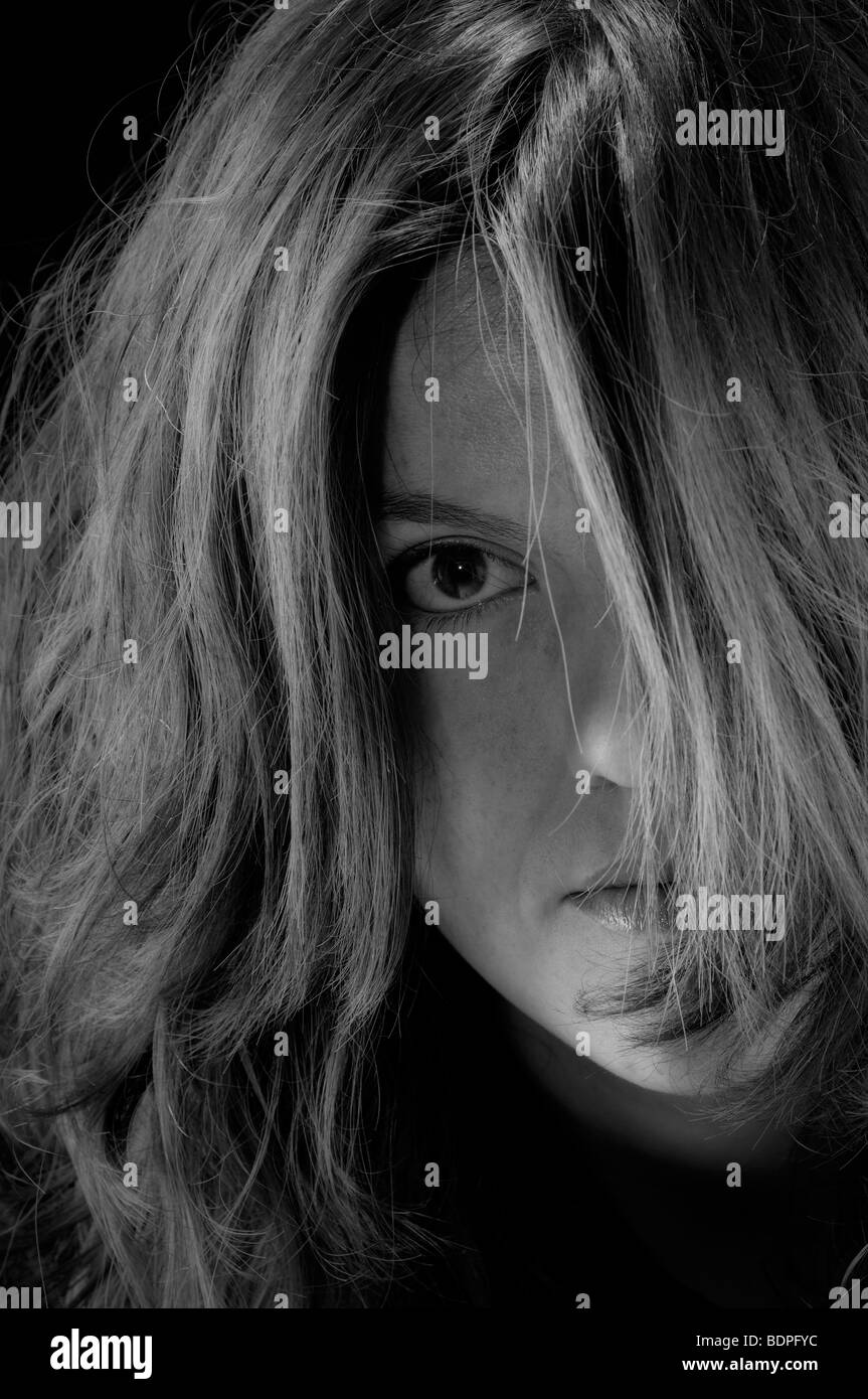 Portrait of woman in studio Stock Photo - Alamy