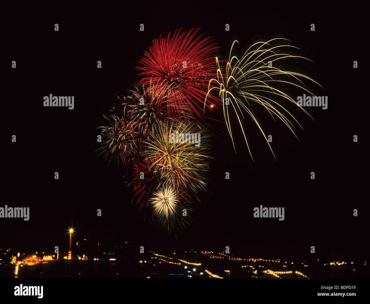 burst of fireworks and street lights Stock Photo - Alamy