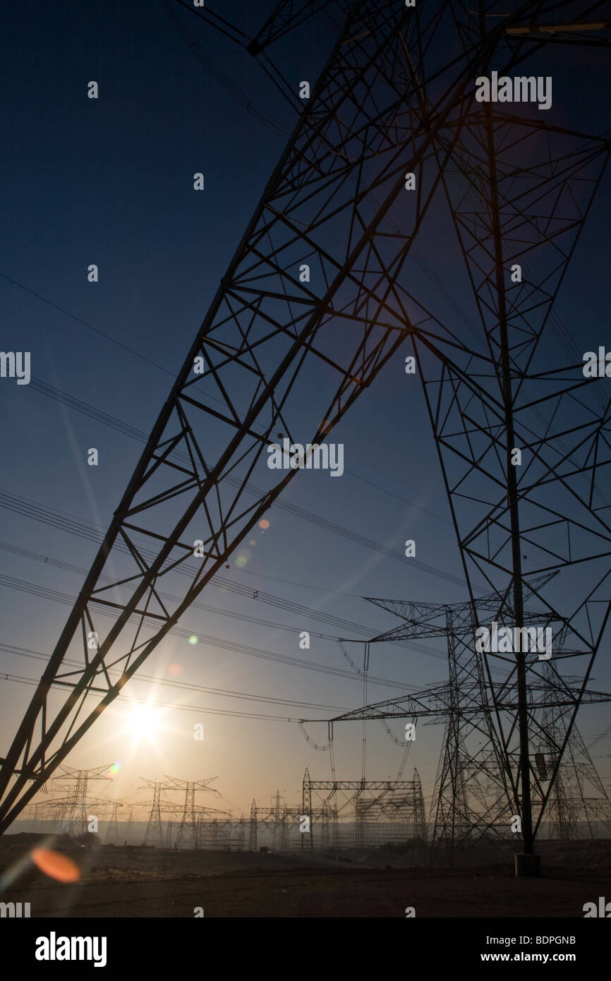 Transmission power line cables towers lines tower Stock Photo - Alamy