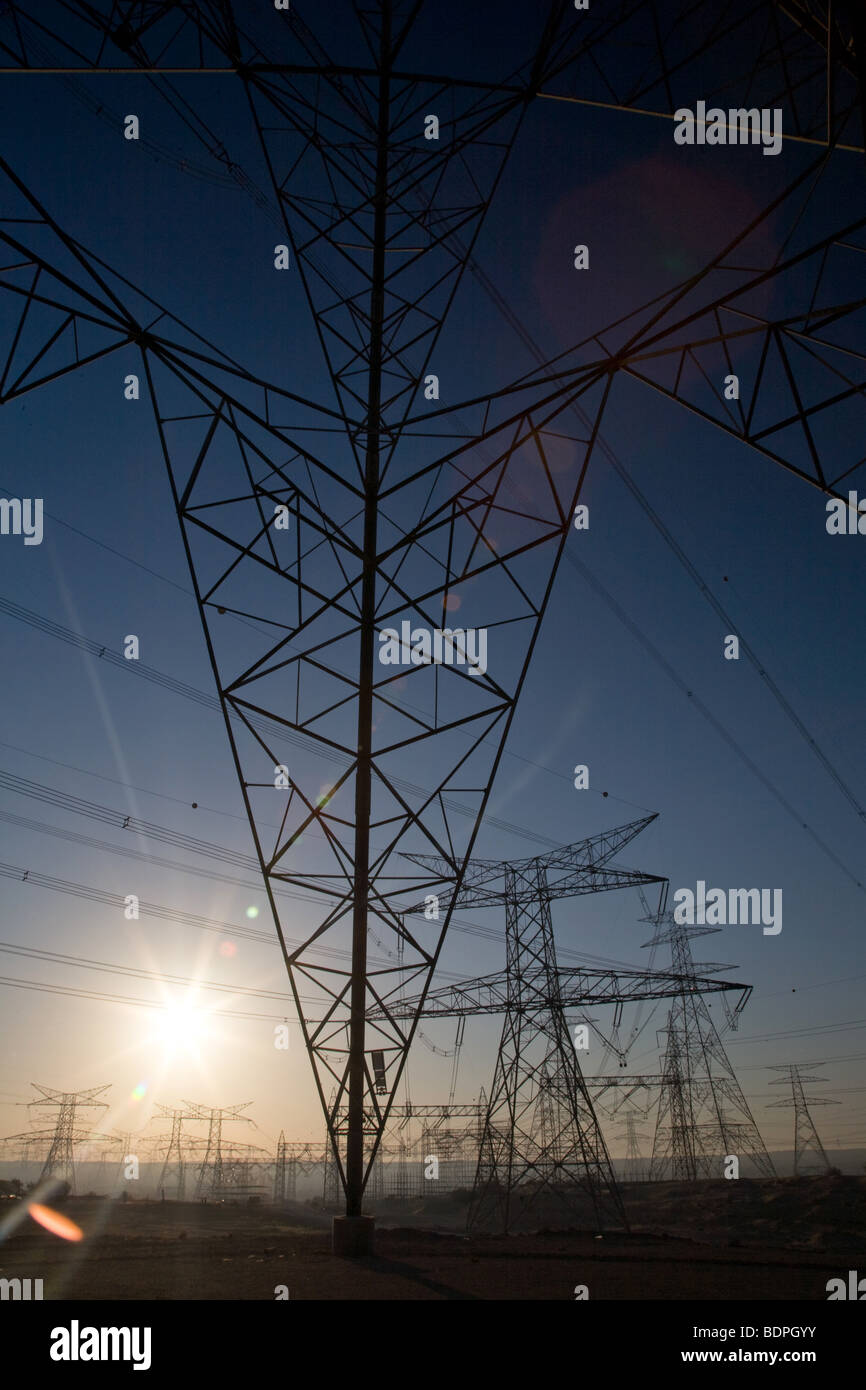 Transmission power line cables towers lines tower Stock Photo - Alamy