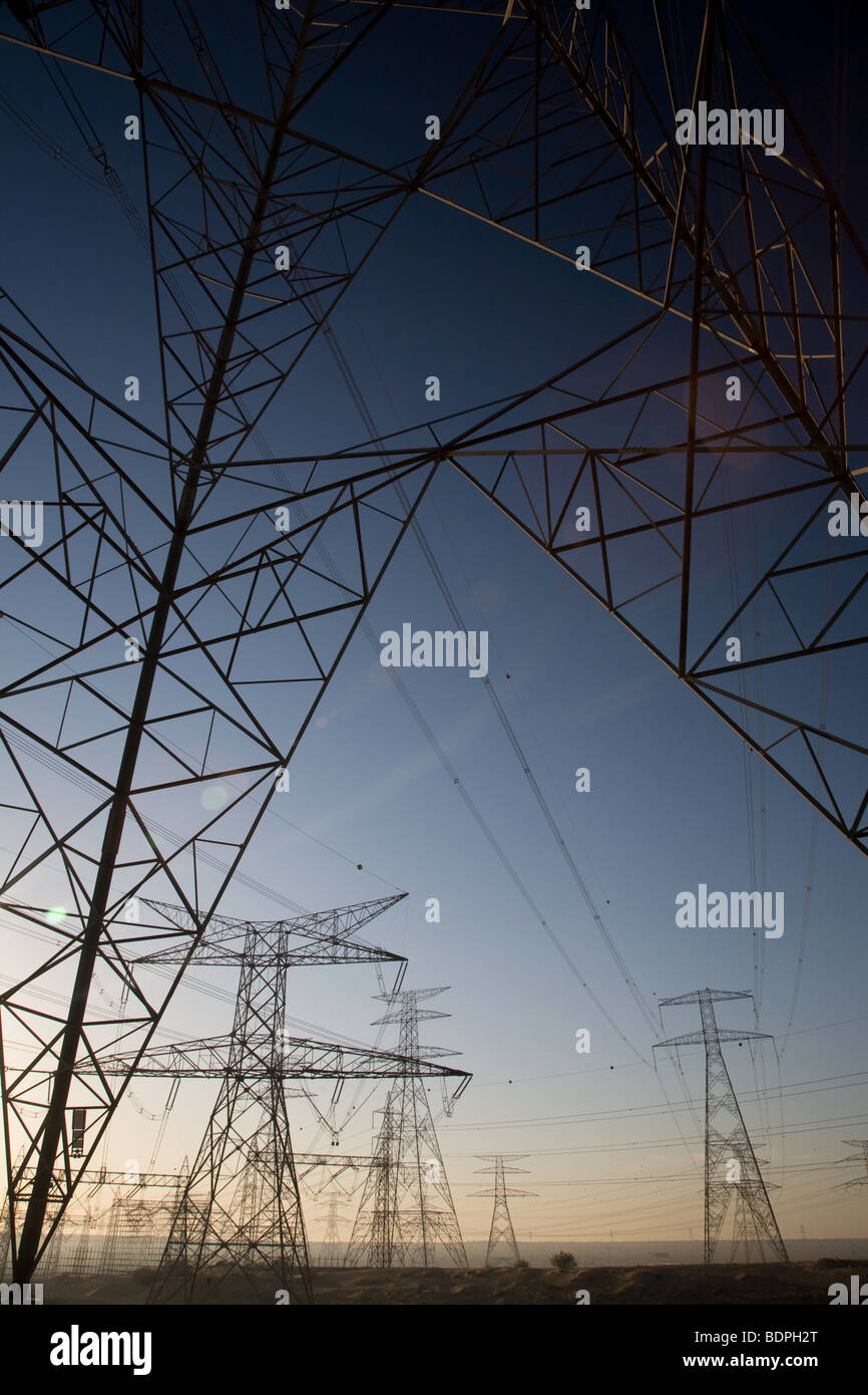 Transmission power line cables towers lines tower Stock Photo - Alamy