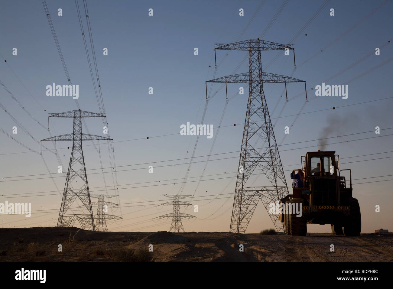 Transmission power line cables towers lines tower Stock Photo - Alamy