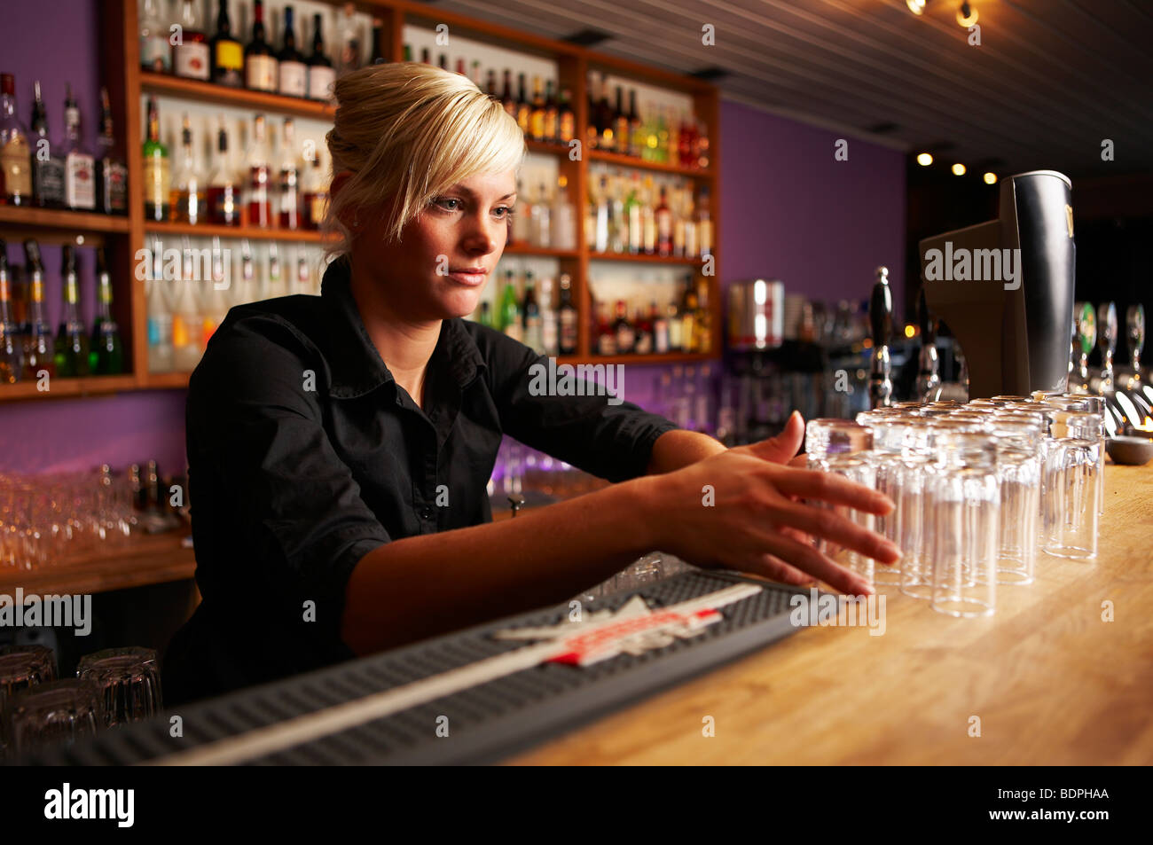Young Scandinavian female bartender Sweden Stock Photo - Alamy