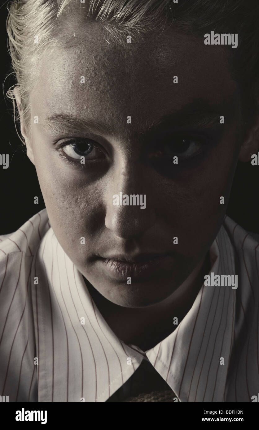 A young woman with blonde hair looking directly at the camera Stock ...