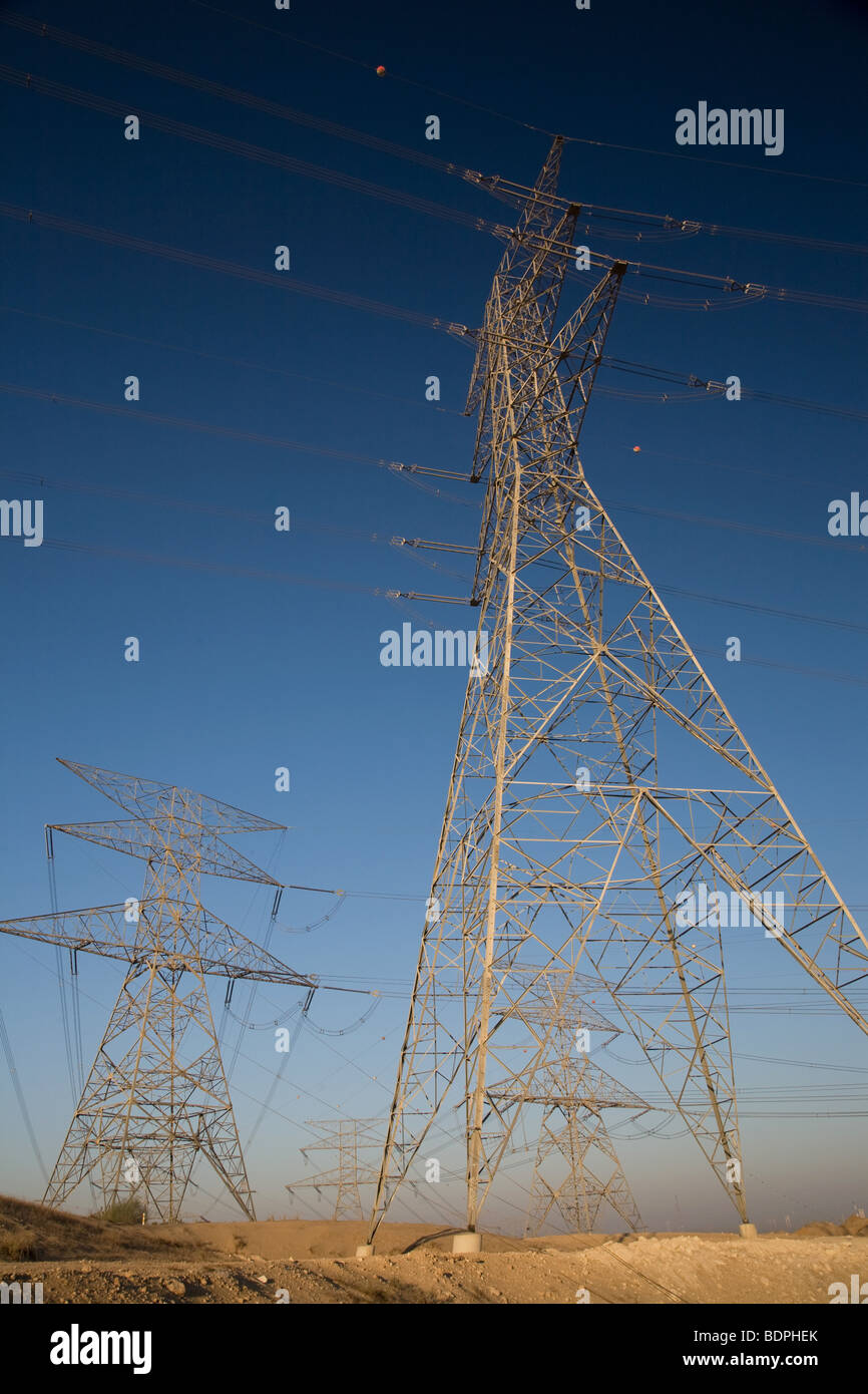 Transmission power line cables towers lines tower Stock Photo - Alamy