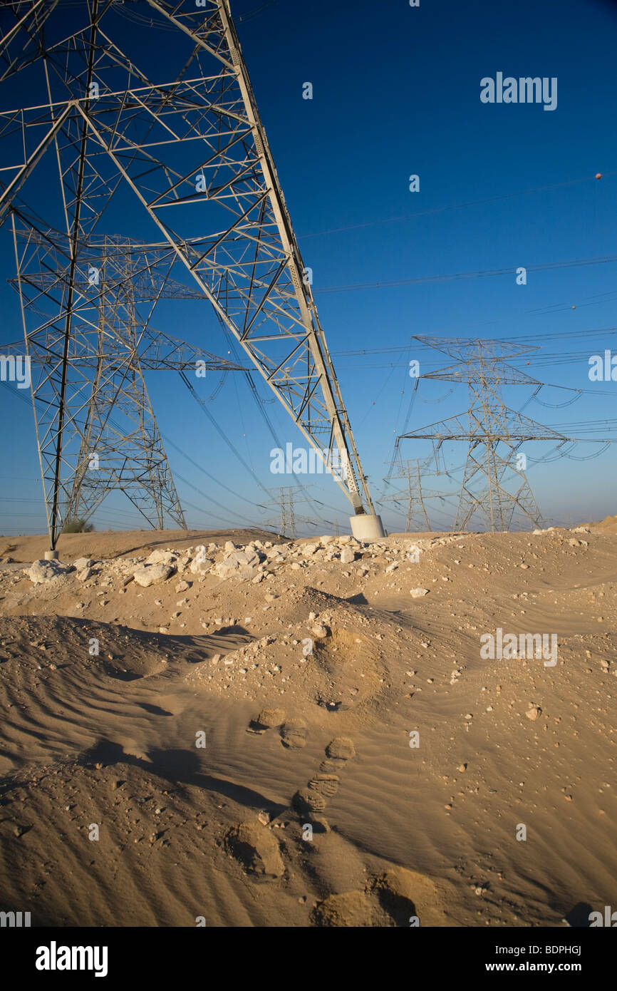 Transmission power line cables towers lines tower Stock Photo - Alamy