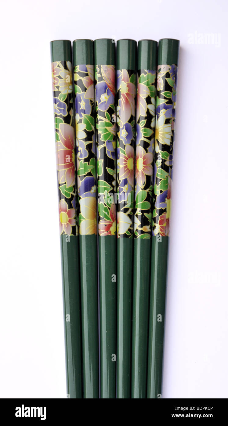 Three pairs of green chopsticks Stock Photo - Alamy