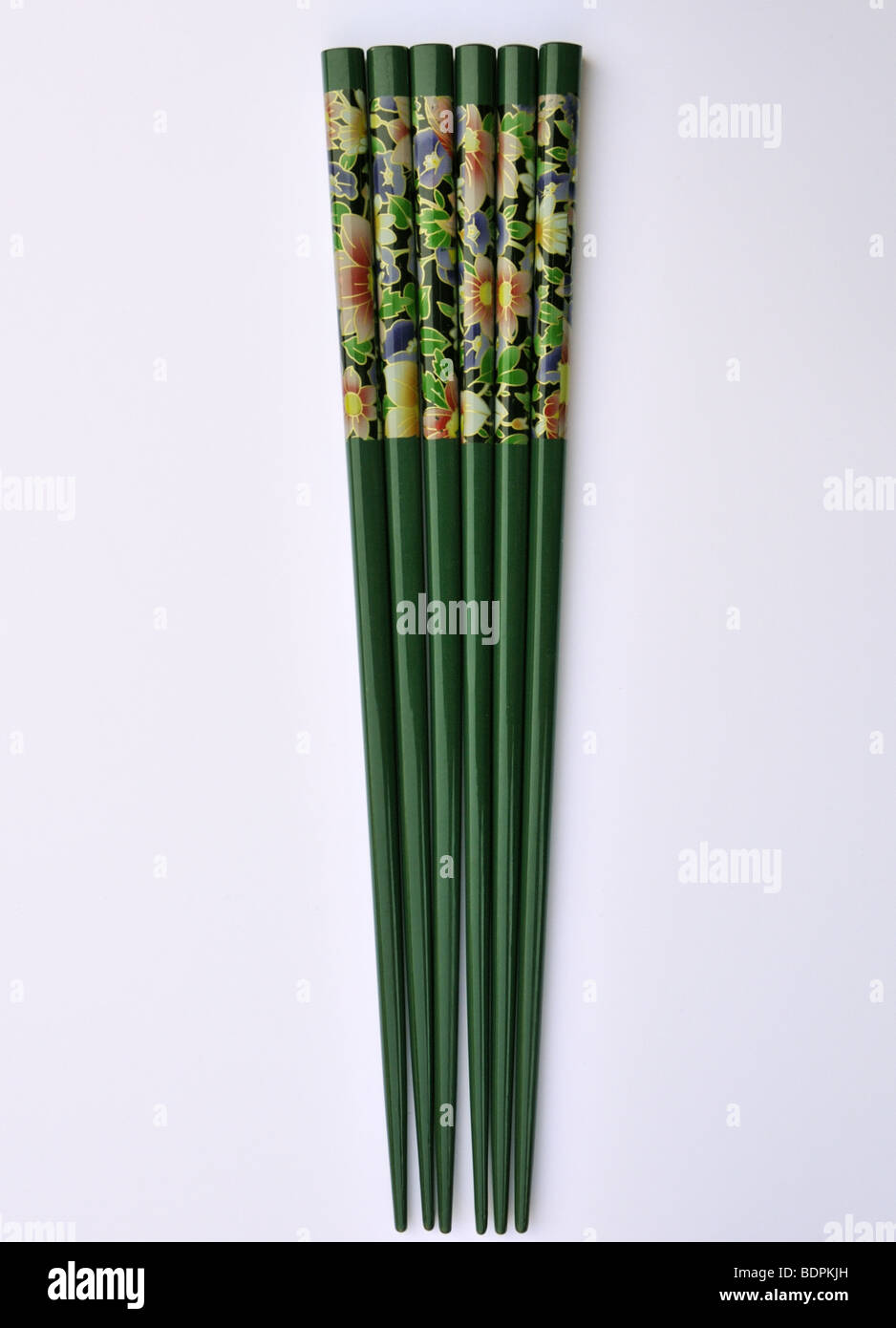 Three pairs of green chopsticks Stock Photo - Alamy