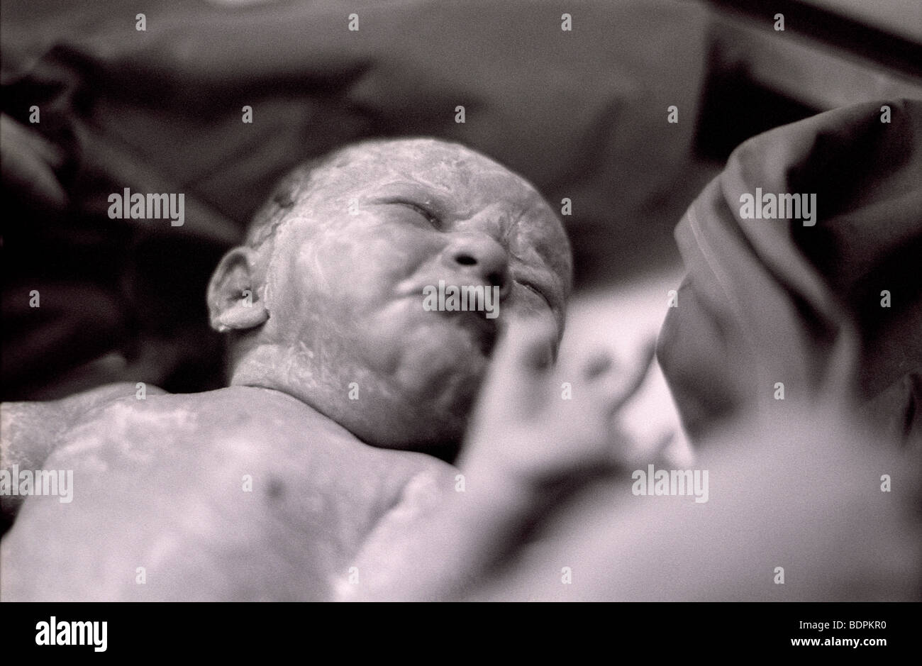 Baby cleaned after birth hi-res stock photography and images - Alamy