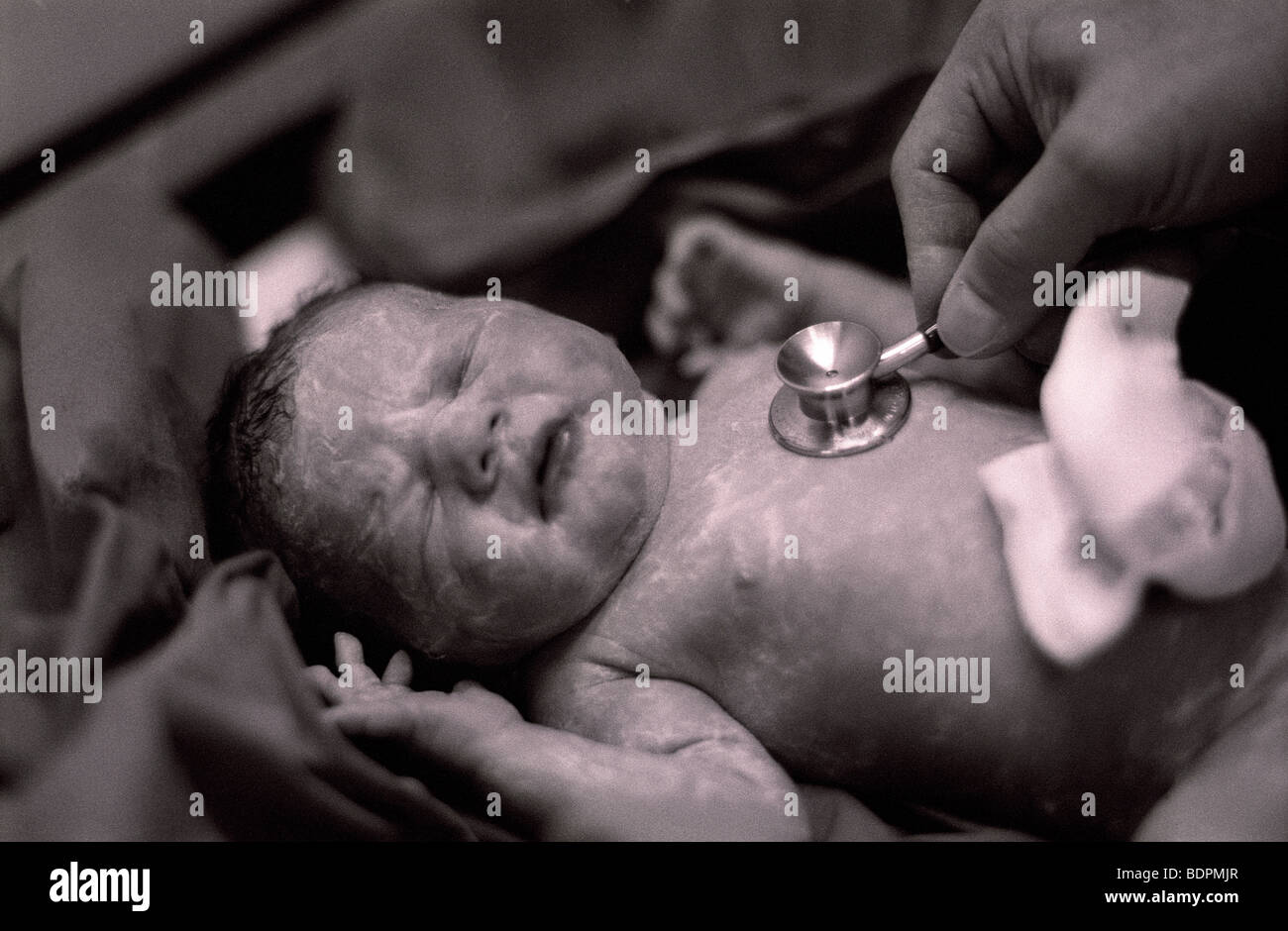 Baby cleaned after birth hi-res stock photography and images - Alamy