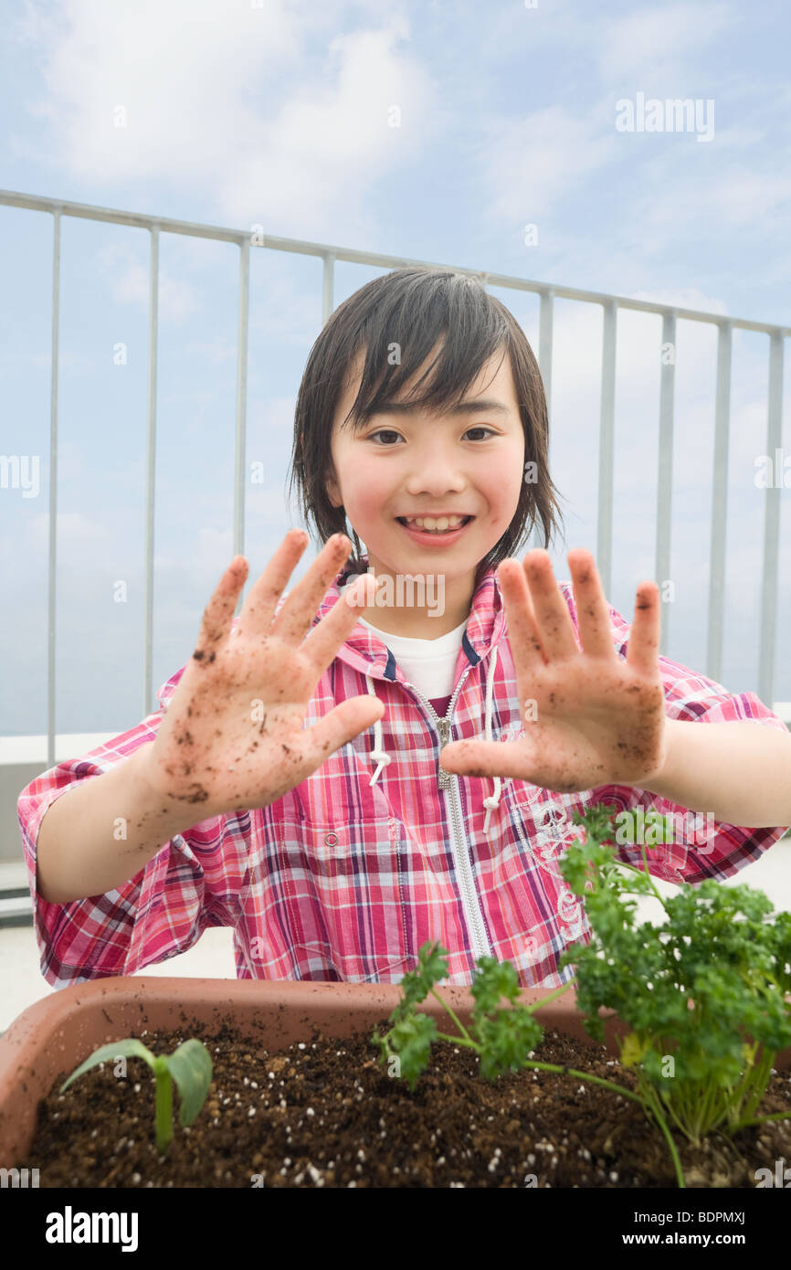 Boy reaching out his palm Stock Photo - Alamy