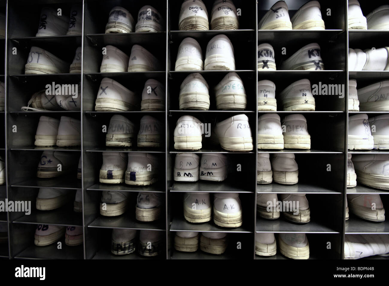 Shoe trainer storage rack white Stock Photo - Alamy
