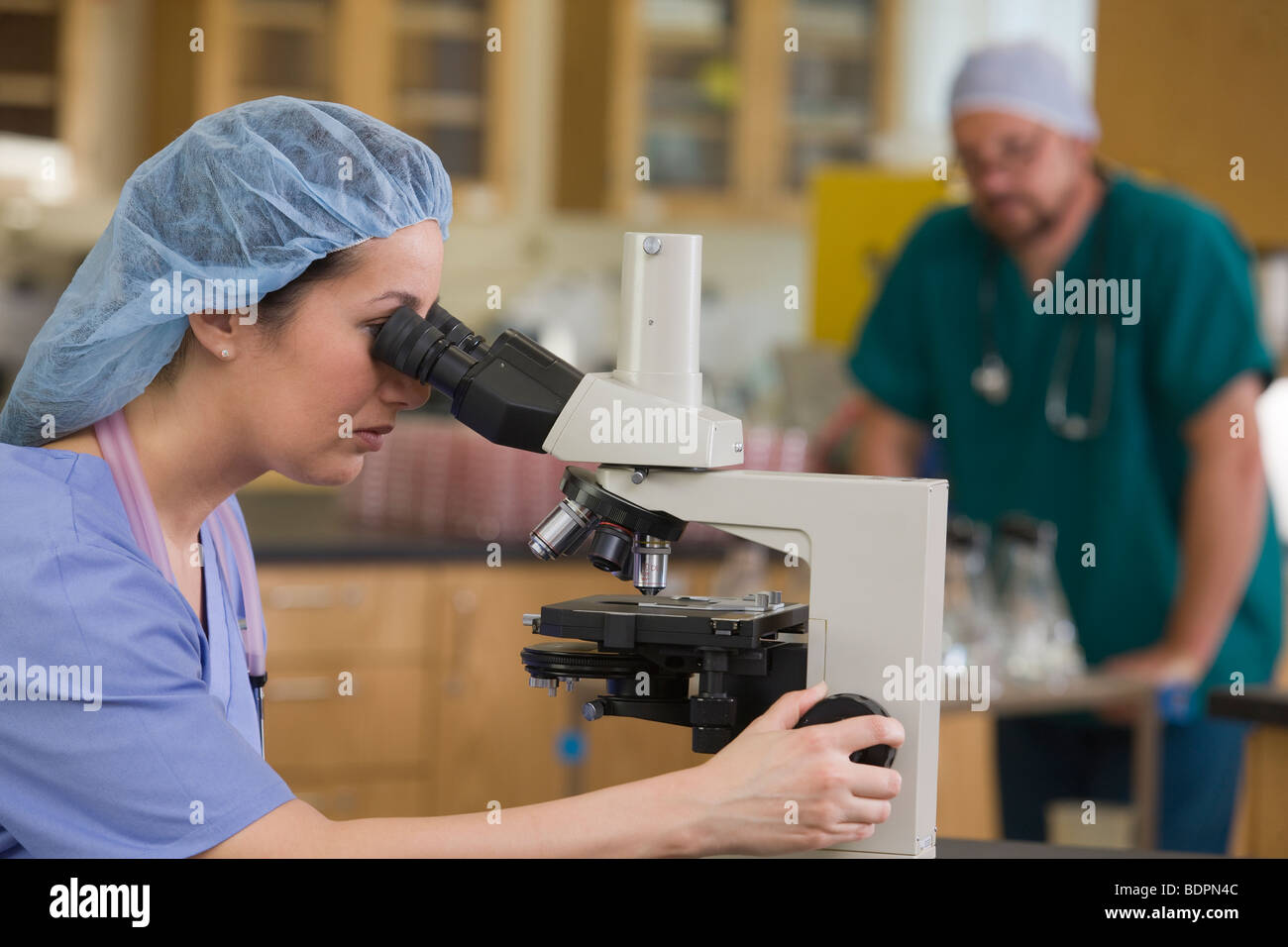 Microscope Looking Bacteria High Resolution Stock Photography and ...