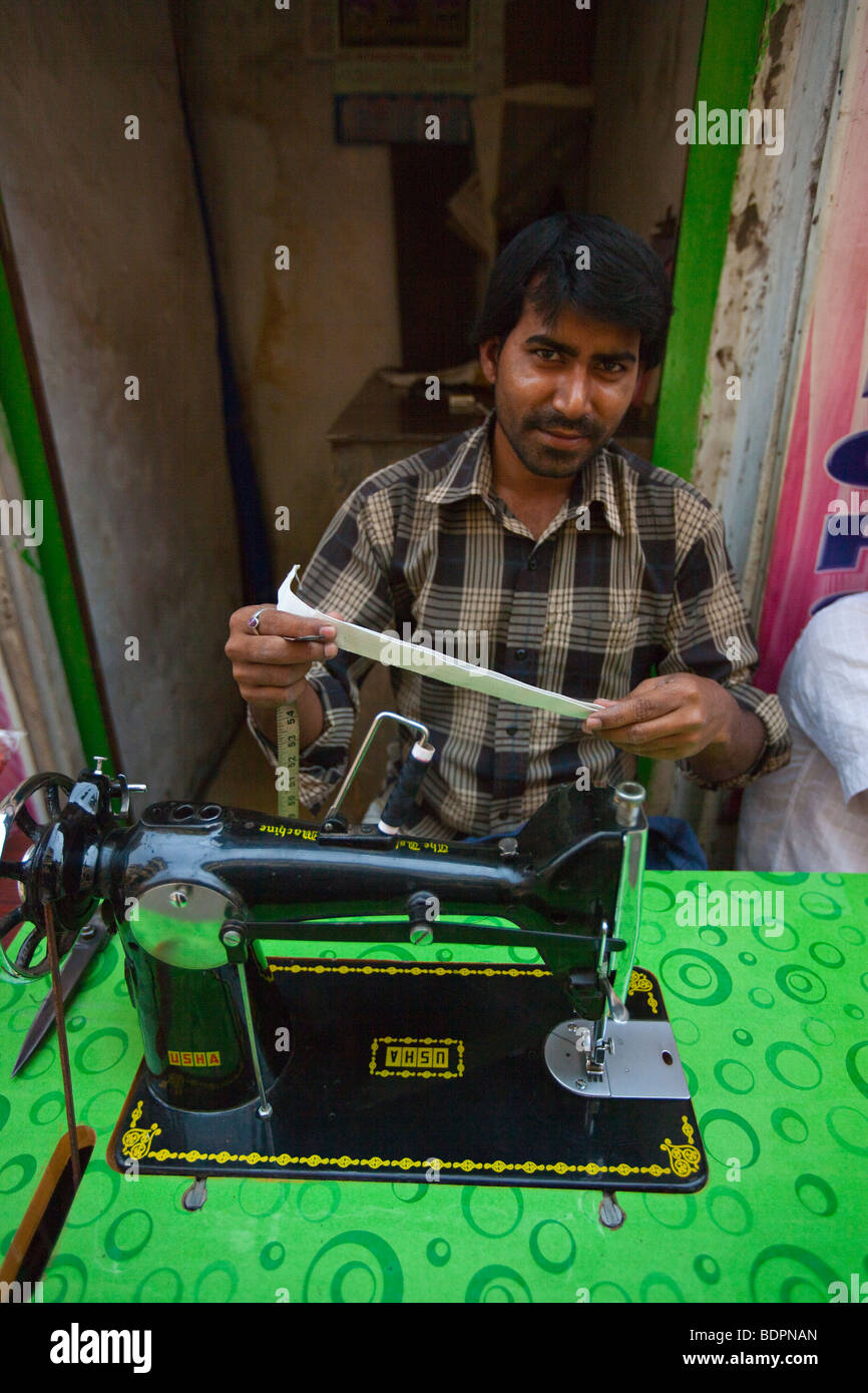 Man using a sewing machine in Calcutta India Stock Photo - Alamy