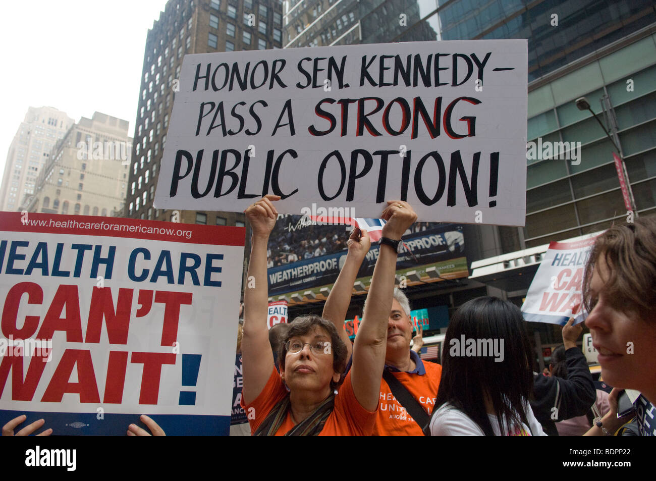 Thousands of supporters of health care reform gather in Times Square in ...