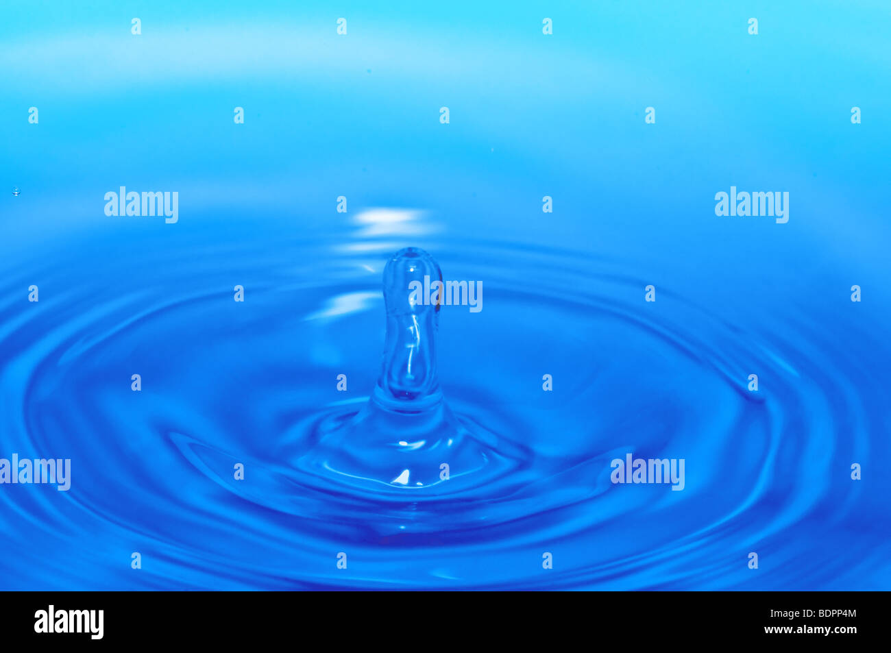 Water splash in ripple. Macro shot Stock Photo - Alamy