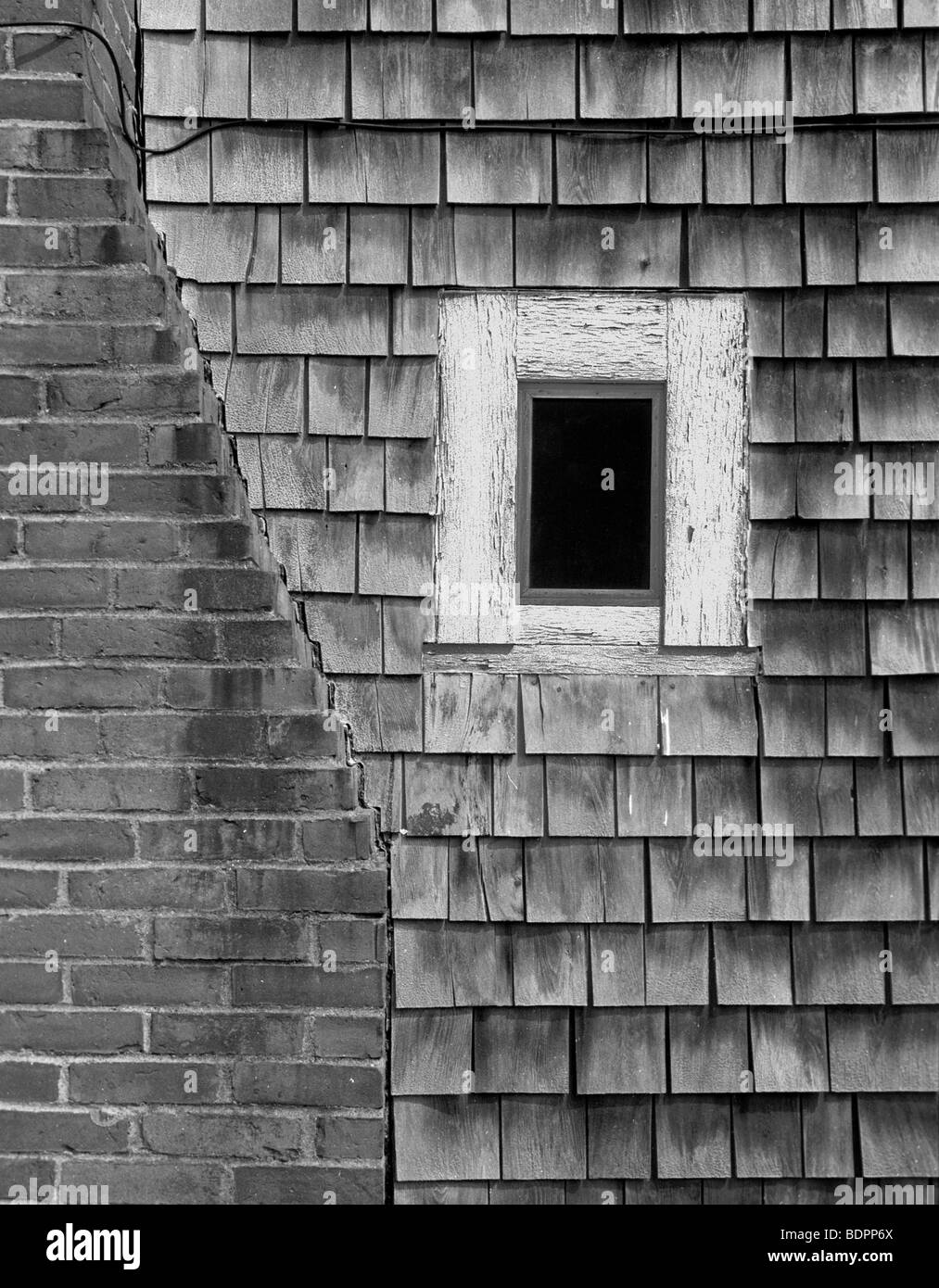A brick chimney with a window Stock Photo - Alamy
