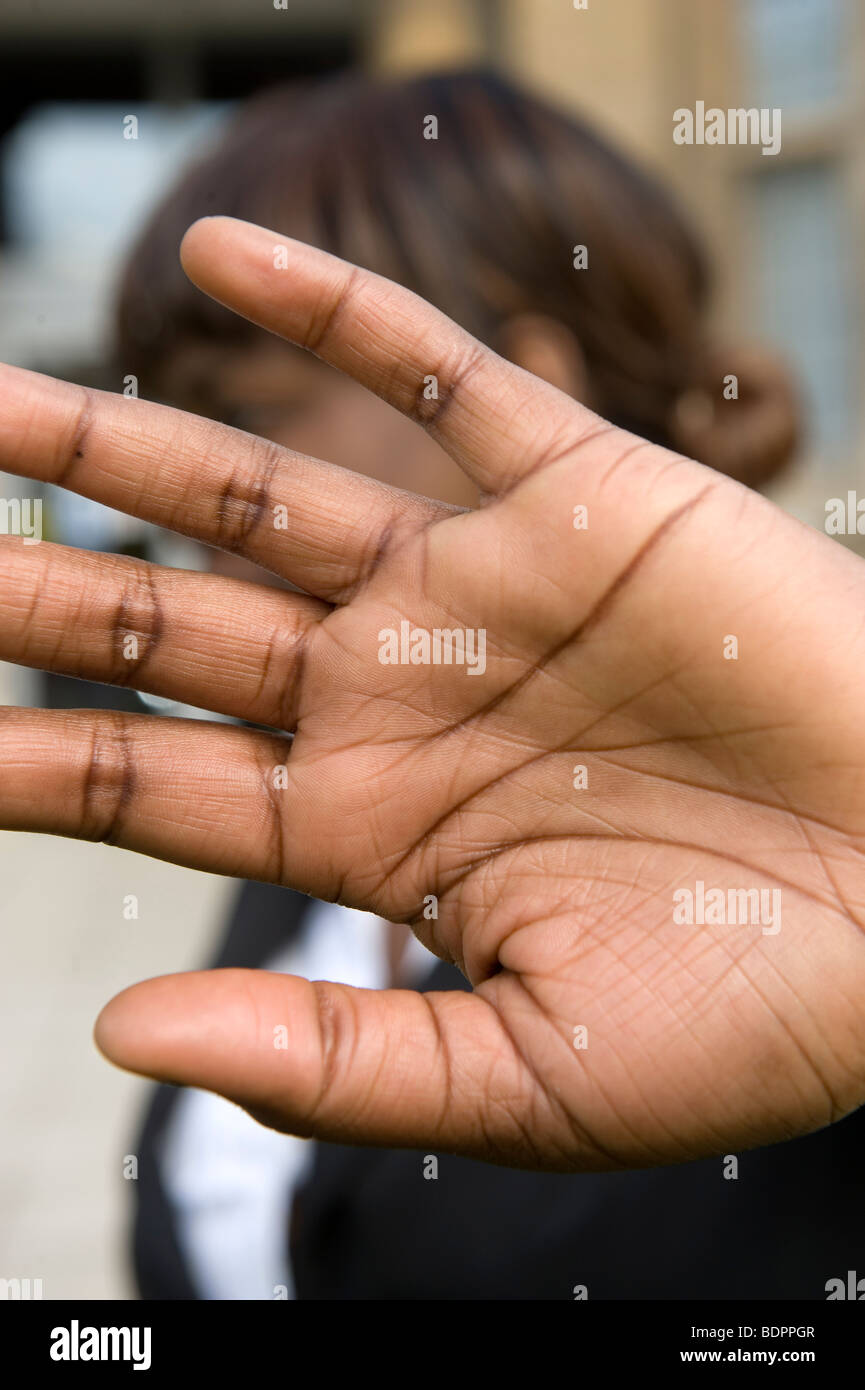 A black hand covers the camera Stock Photo - Alamy