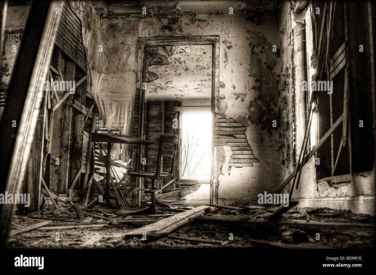 A derelict interior with peeling plaster and broken walls Stock Photo ...