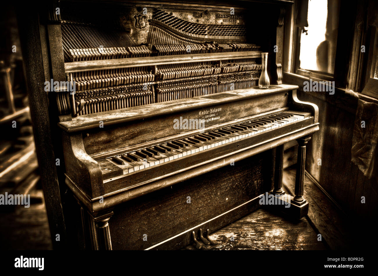 An old upright pianoforte with an open front Stock Photo - Alamy