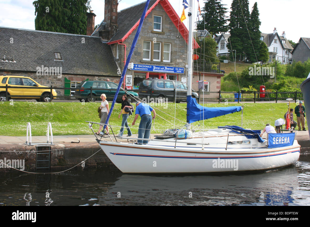 pleasure cruiser in the Caledonian Canal in the pretty village of Fort ...