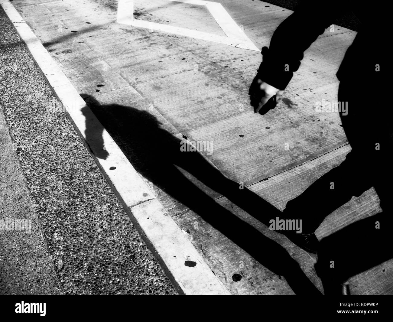 Male walking alone Black and White Stock Photos & Images - Alamy
