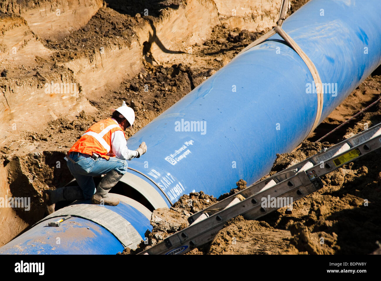 Water pipe being laid at the Louis & Clark Regional Water System ...