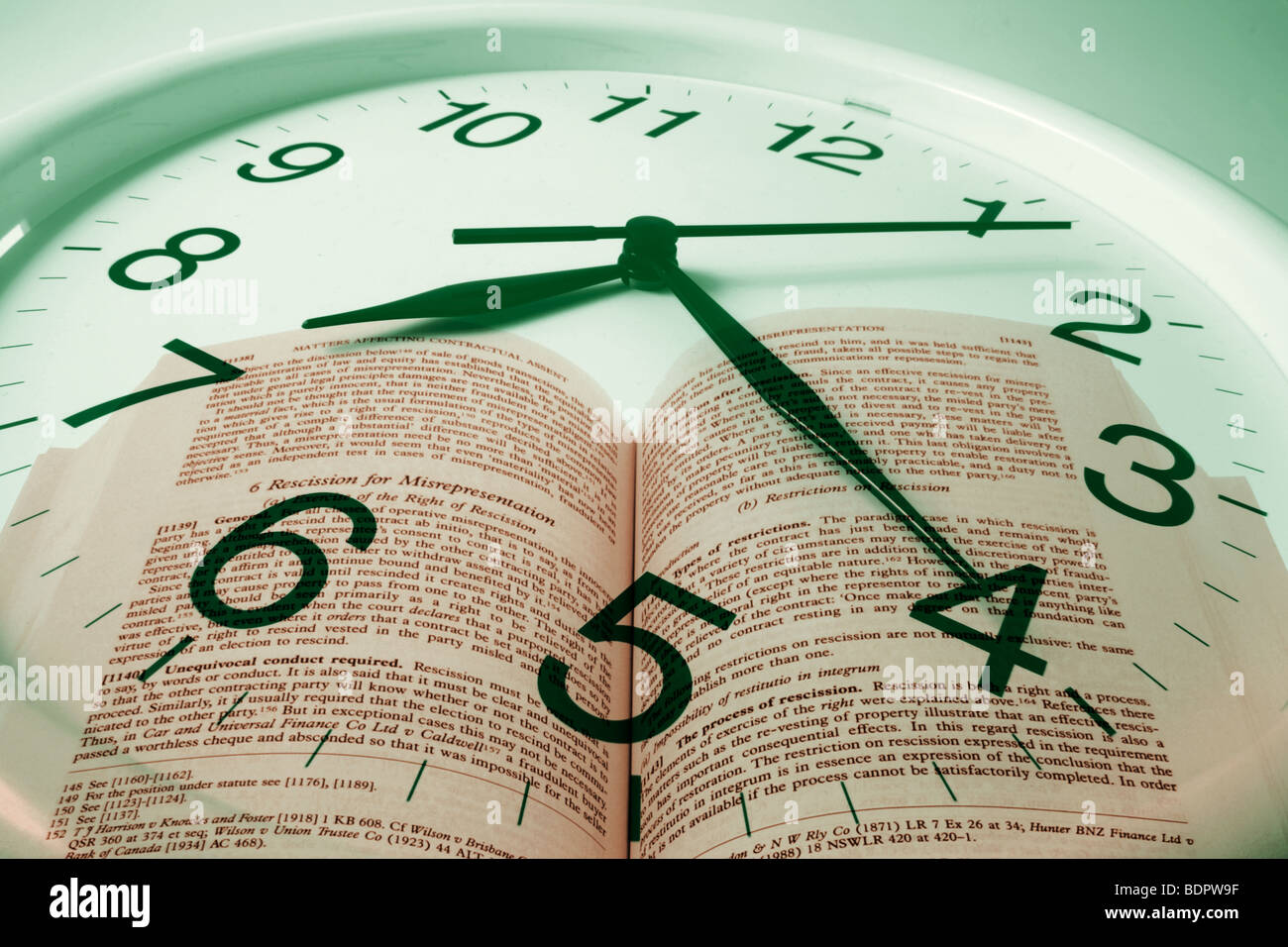 Clock and Book Stock Photo - Alamy