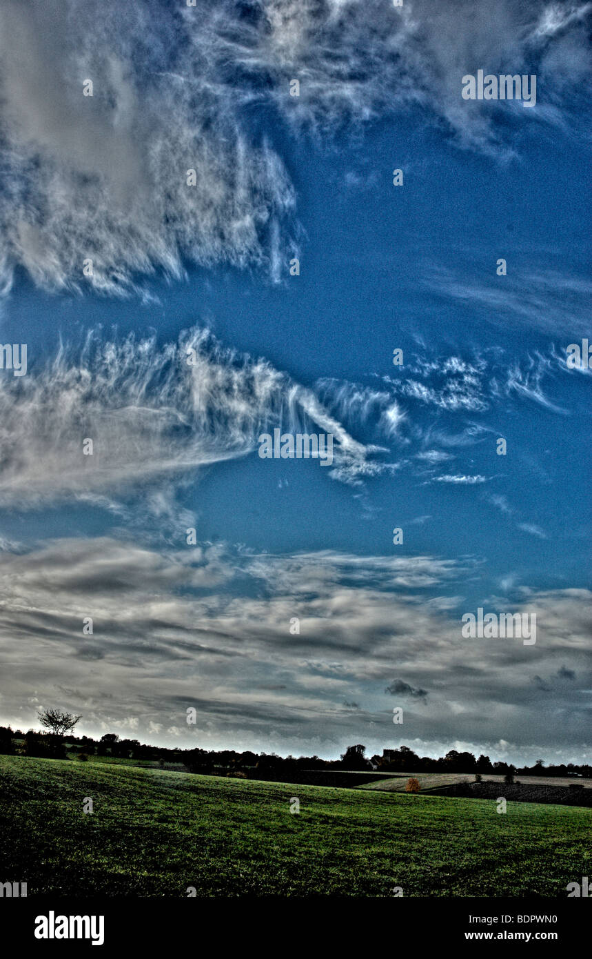 Clouds over fields Stock Photo - Alamy