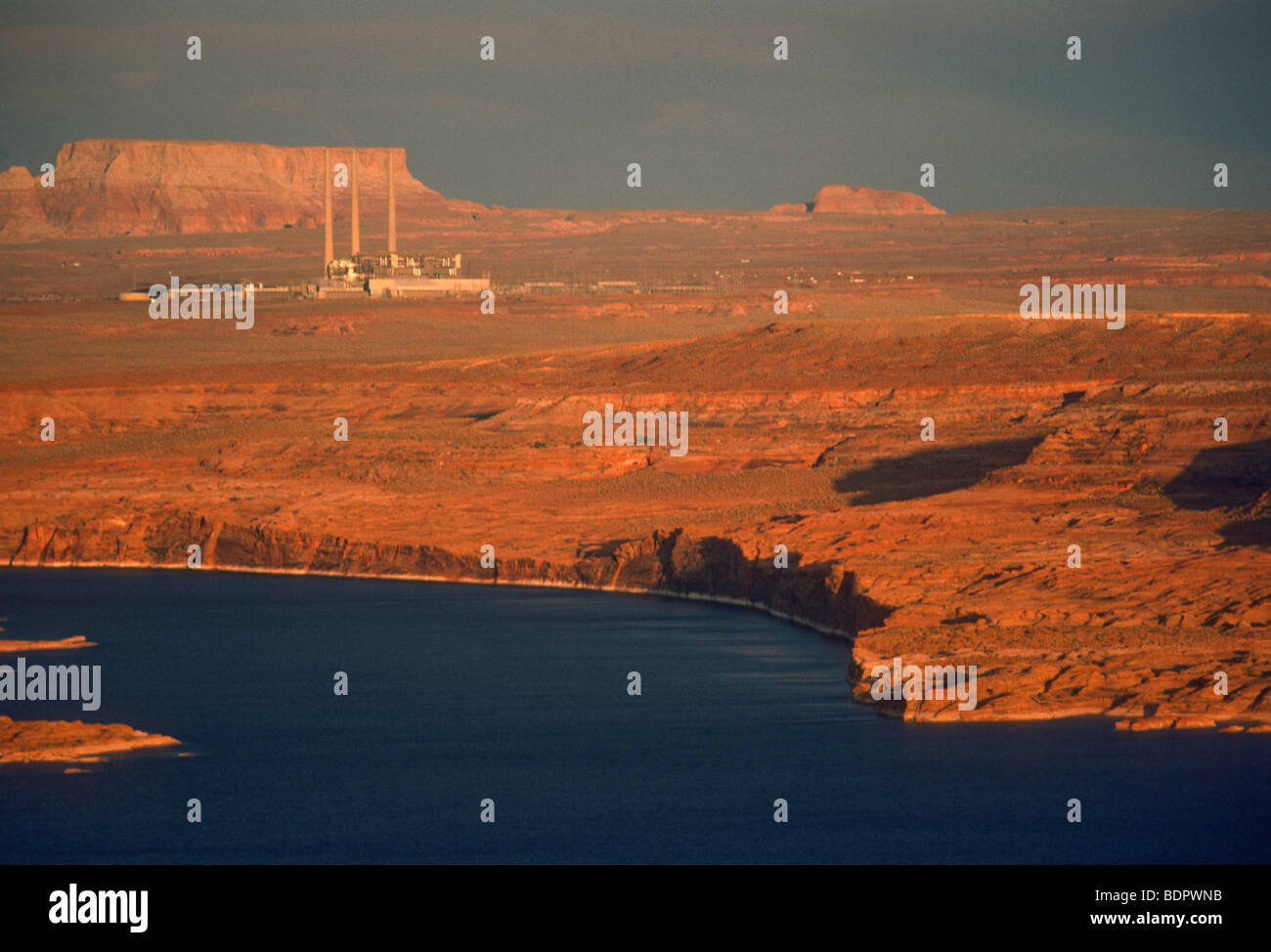 Sunset over Lake Powell, power plant in background Stock Photo - Alamy