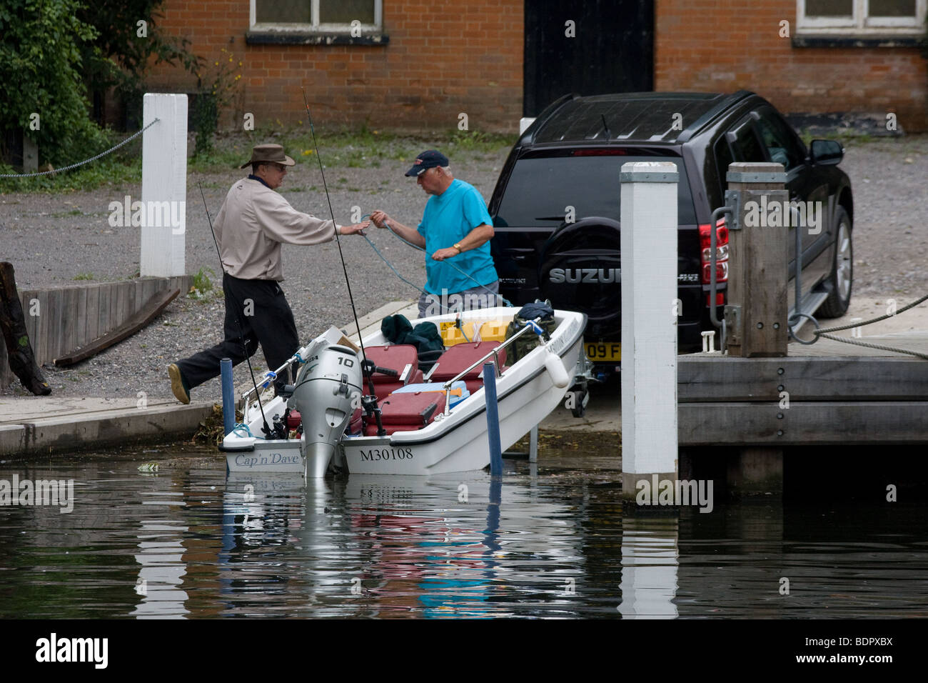Slipway outboard dinghy launching boat hi-res stock photography and ...