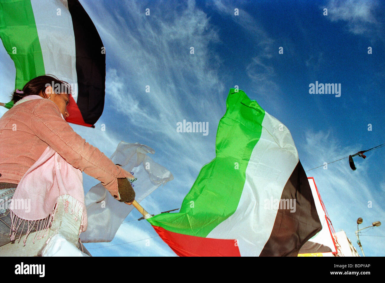 Waving the palestinian flag hi-res stock photography and images - Alamy