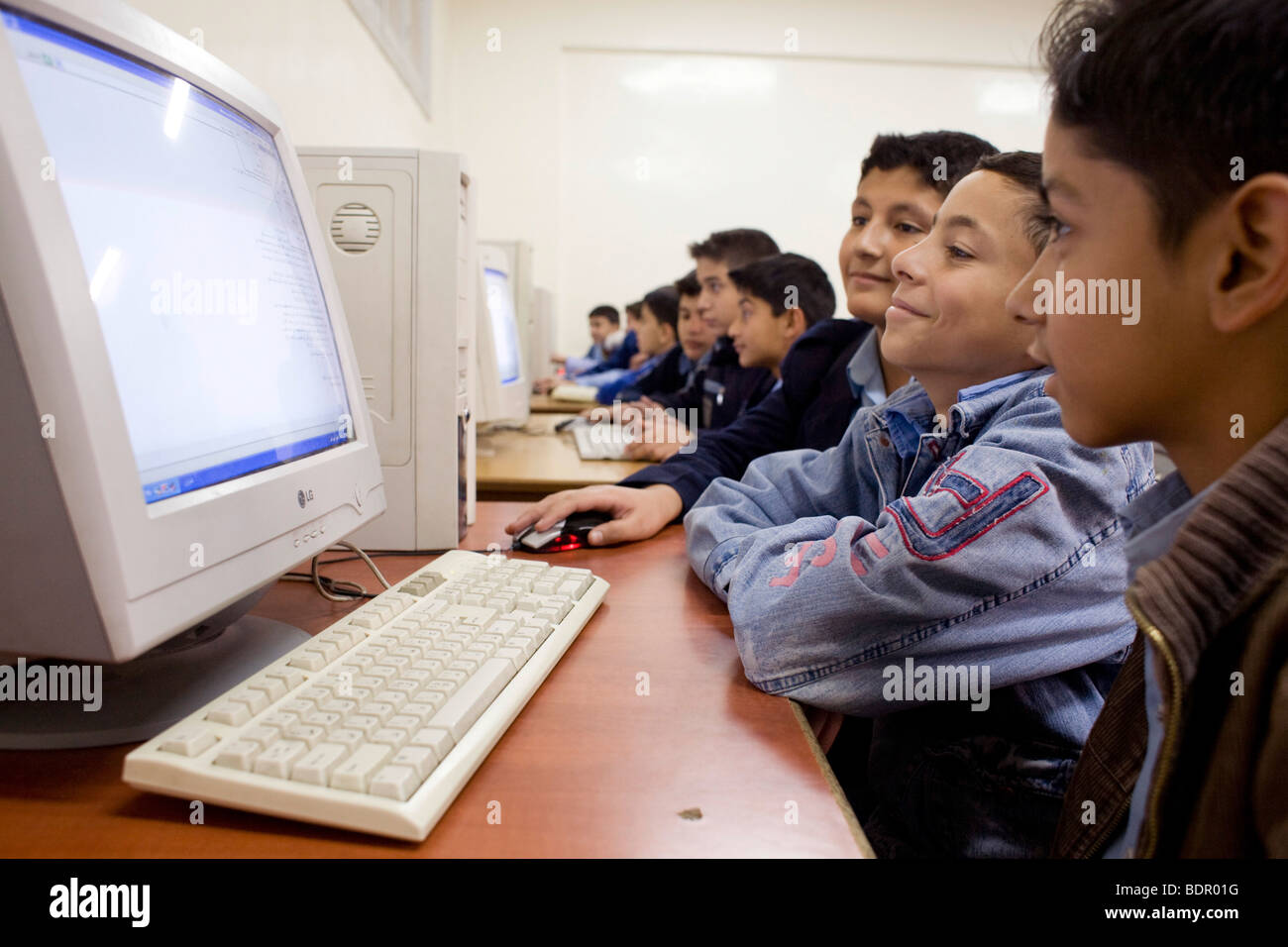Students using computer at school Stock Photo - Alamy