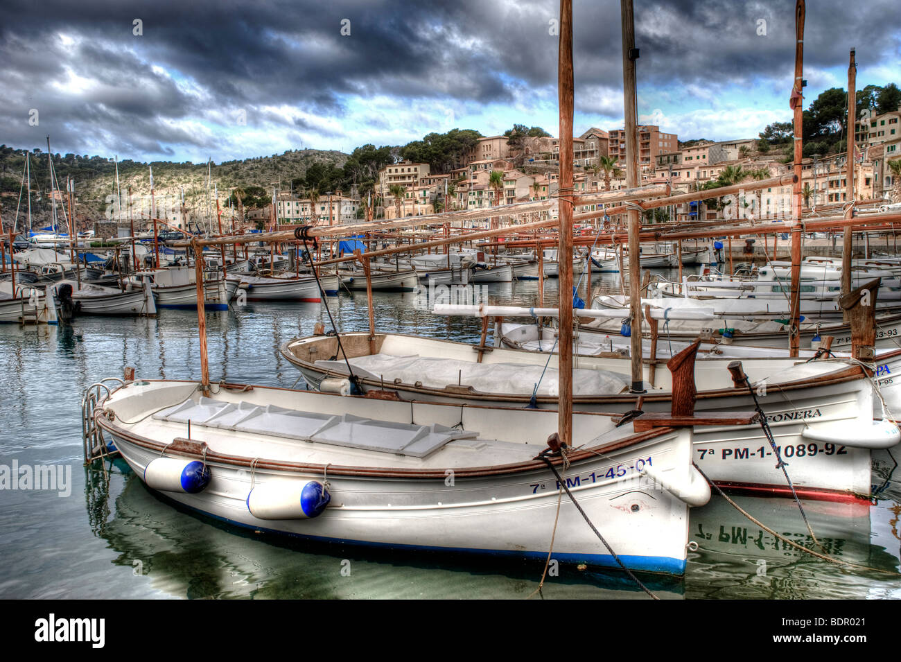 A harbour scene with small fishing boats Stock Photo - Alamy