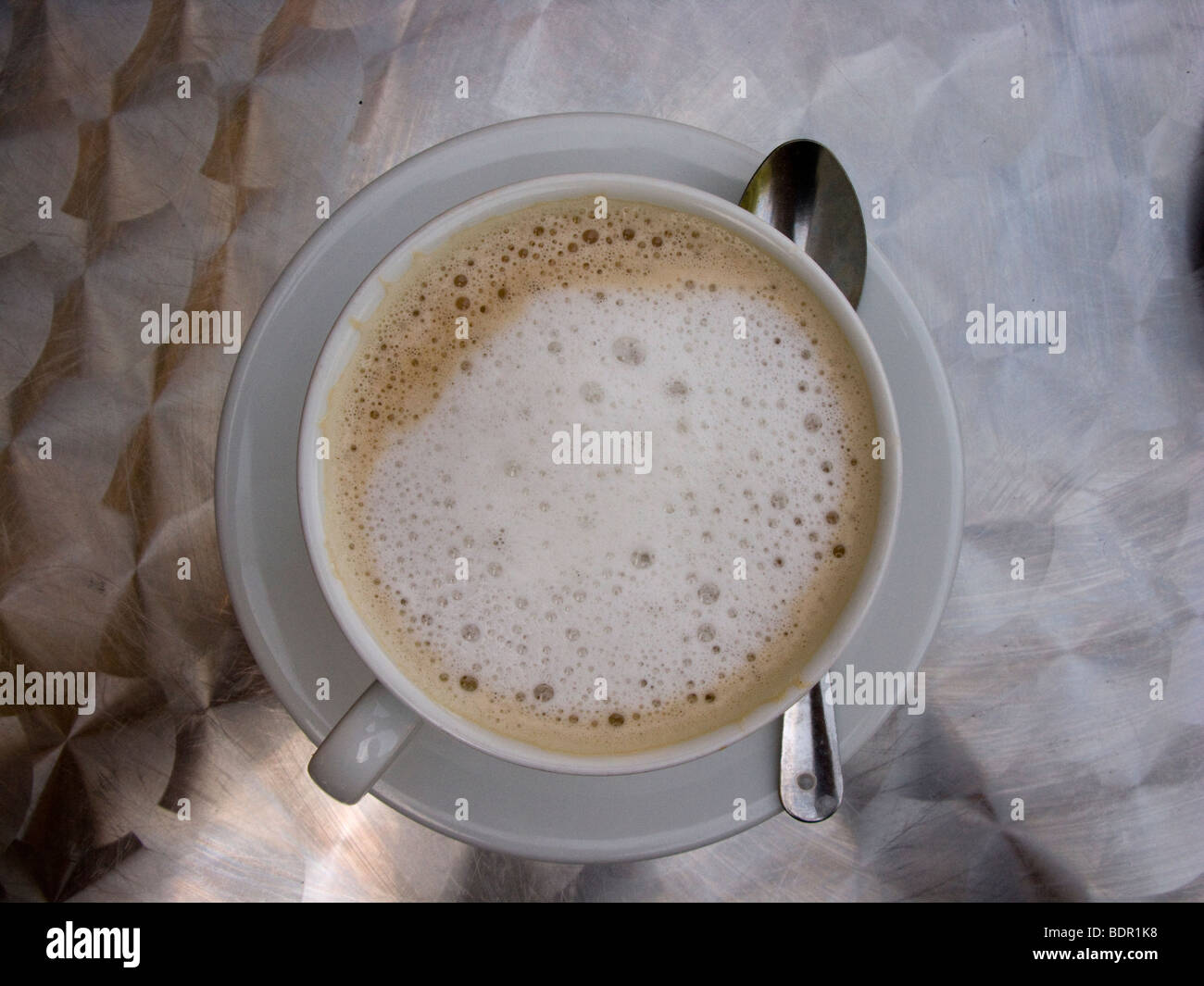 looking down at a coffee cup on table top Stock Photo - Alamy