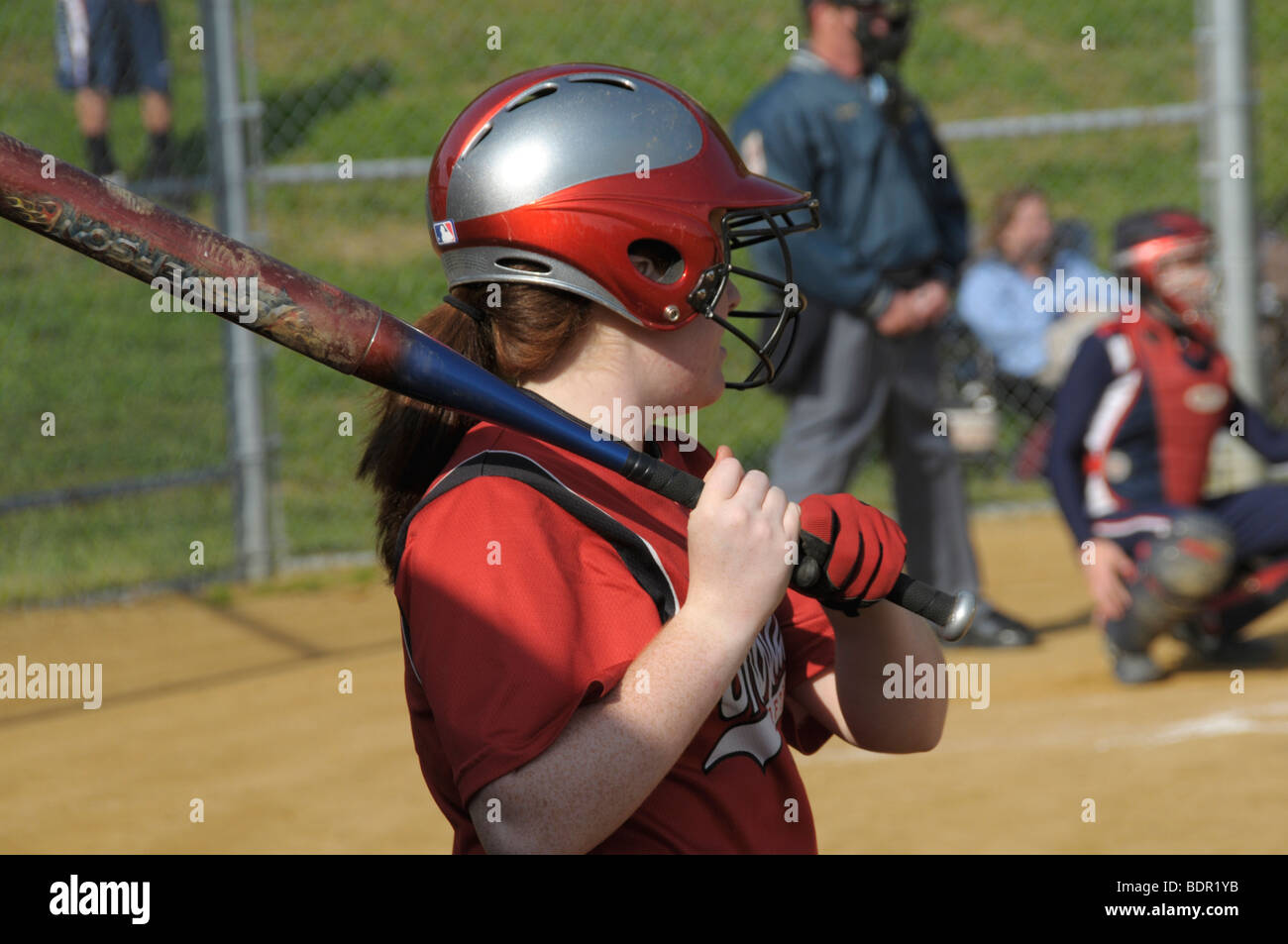 batter in girl's high school softball game Stock Photo - Alamy